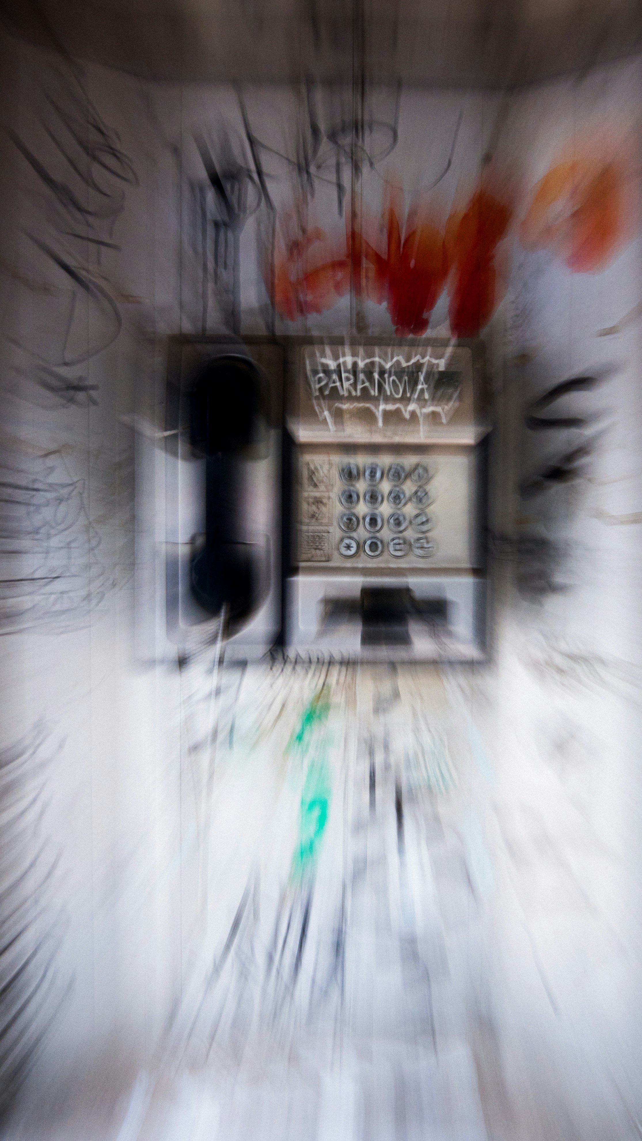 Vortex of Graffiti and Keypad in a Blurred Alley