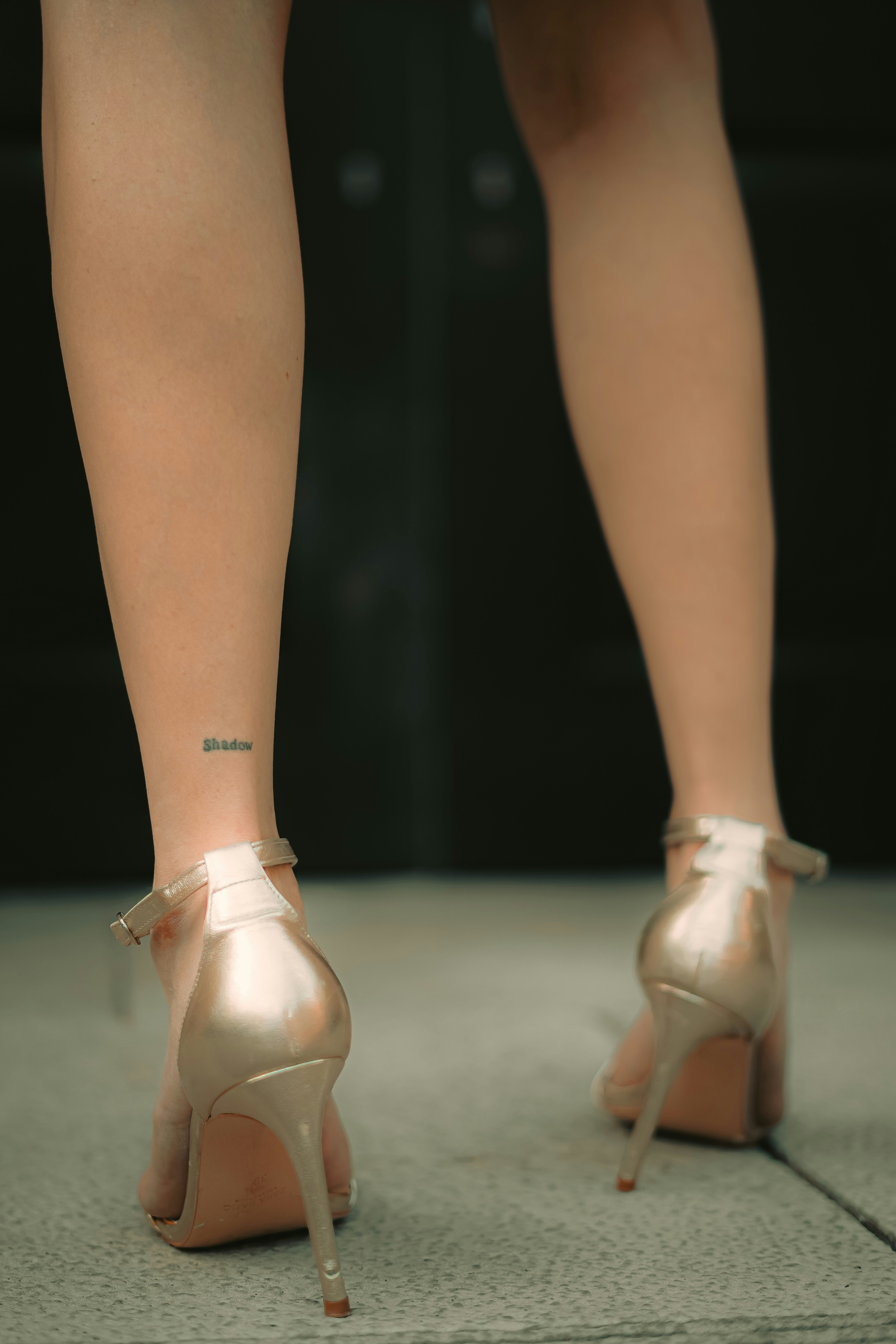 A close up of a person's legs wearing high heels photo – Free Perfume ...