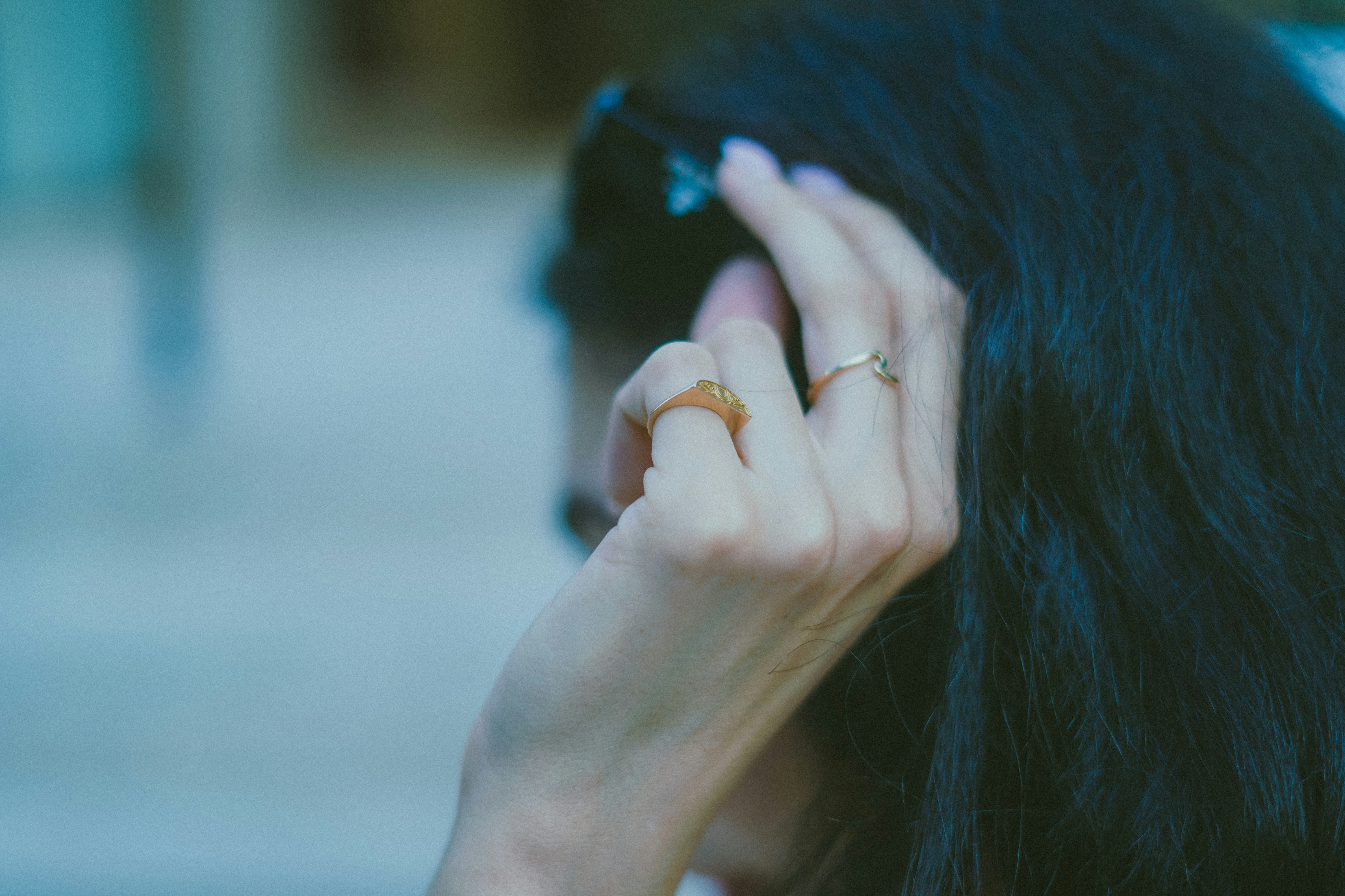 A close up of a person talking on a cell phone photo – Free Finger ...