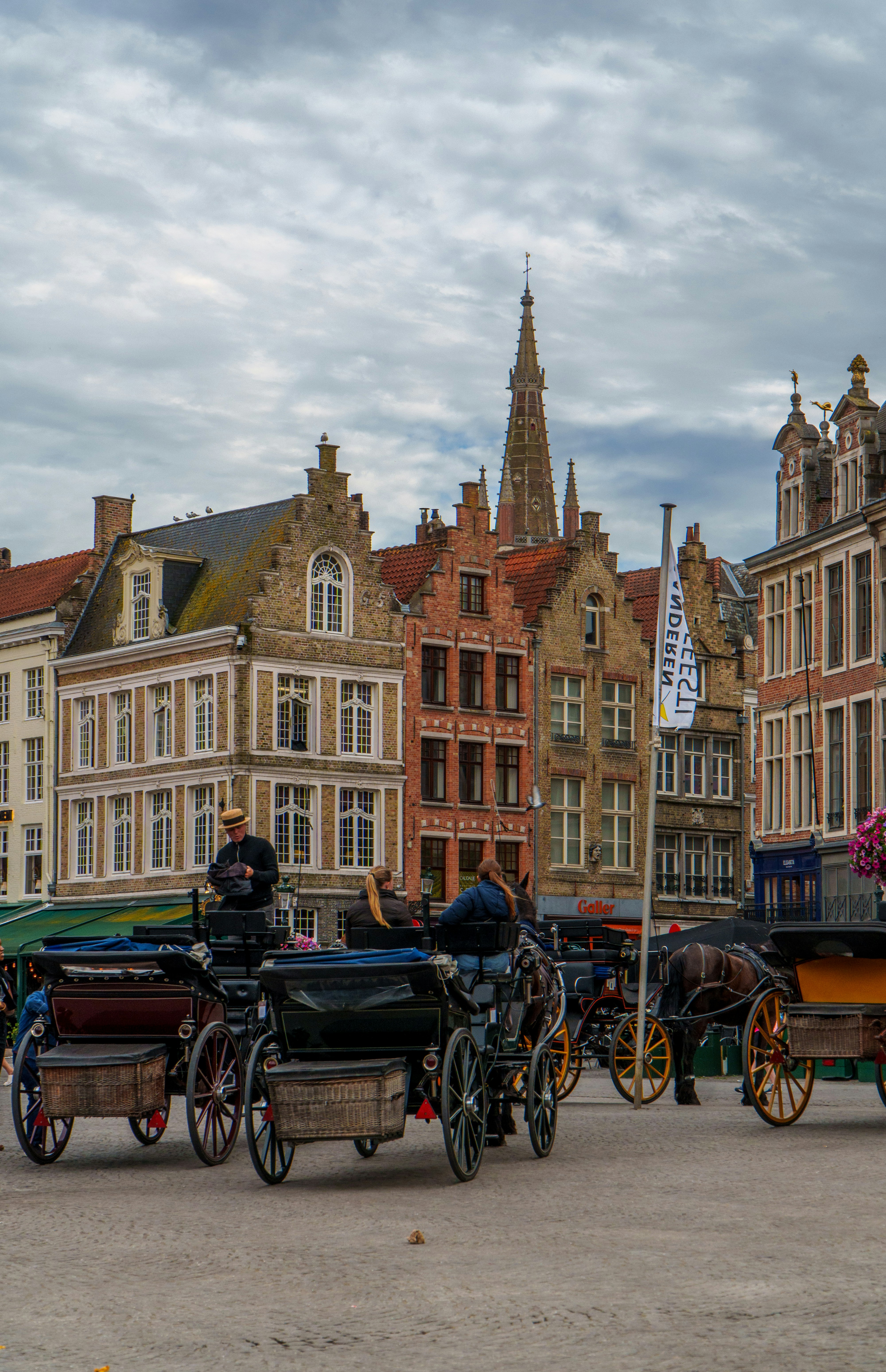 Echoes of the Past: A Carriage Stand Amidst Historic Architecture