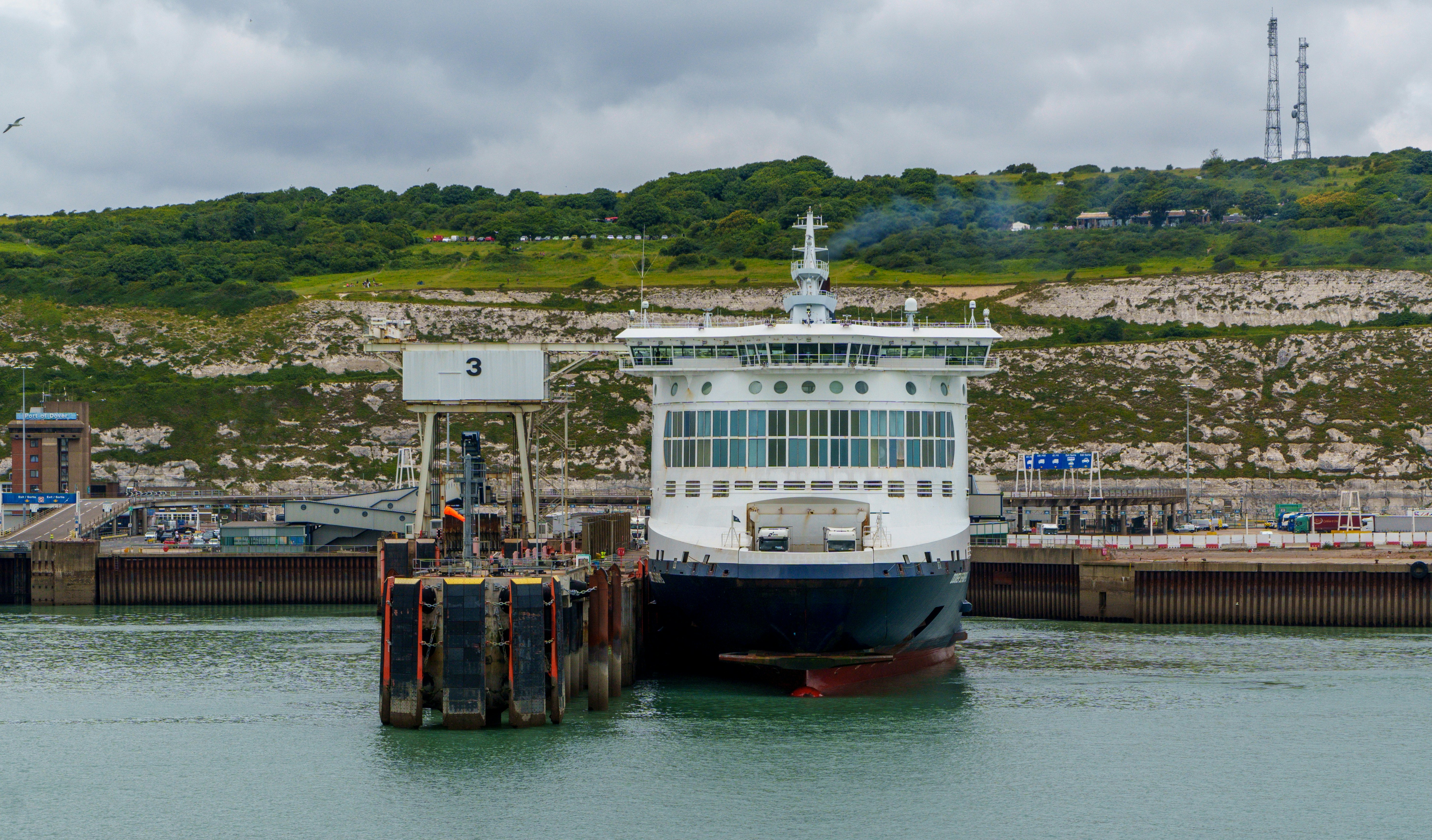 The ferry from Dover to Calais sits in harbour, loading up while it is waiting to go out.