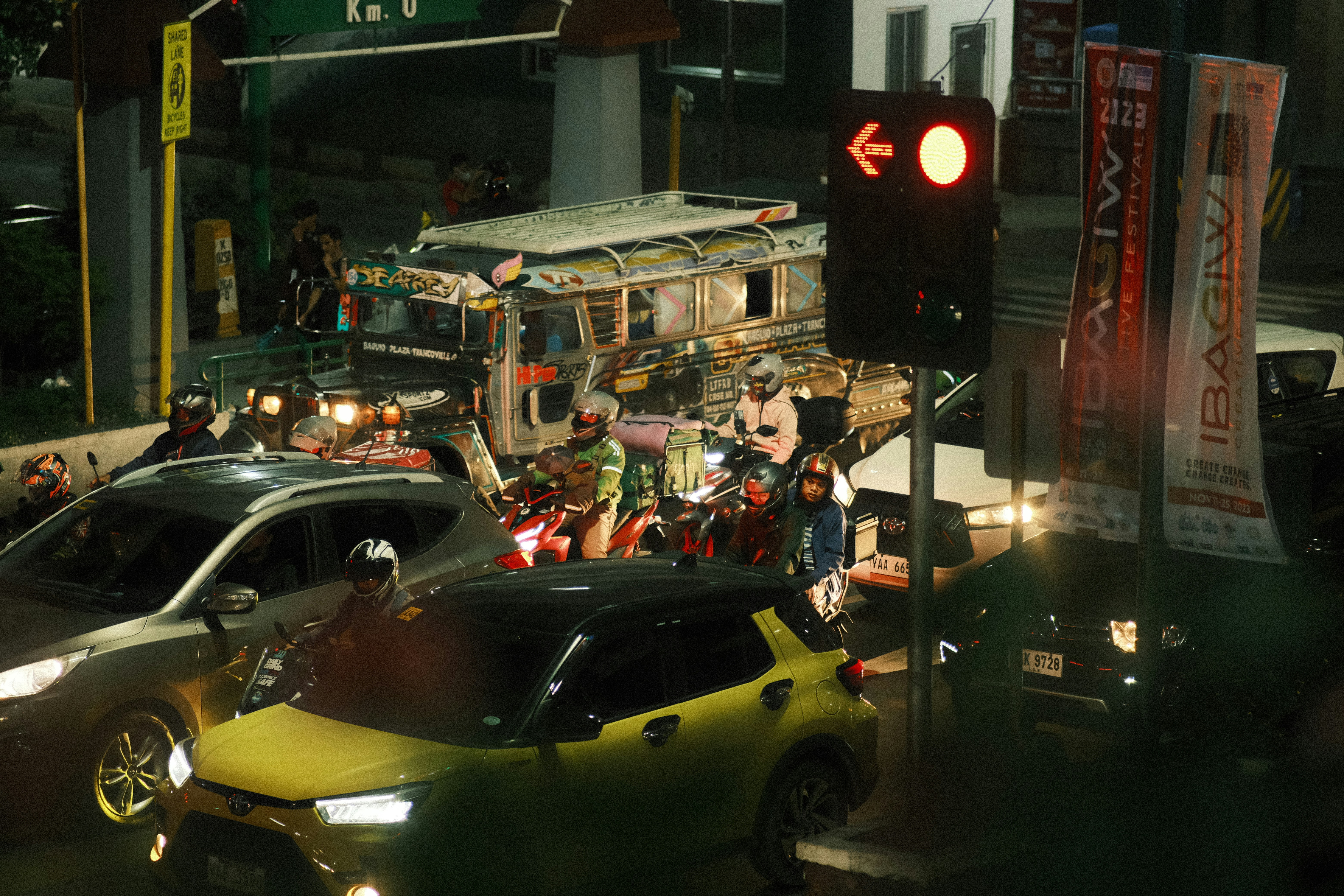 Nighttime Manila Jam: A Thermos of Taxi Lights Cut by Traffic