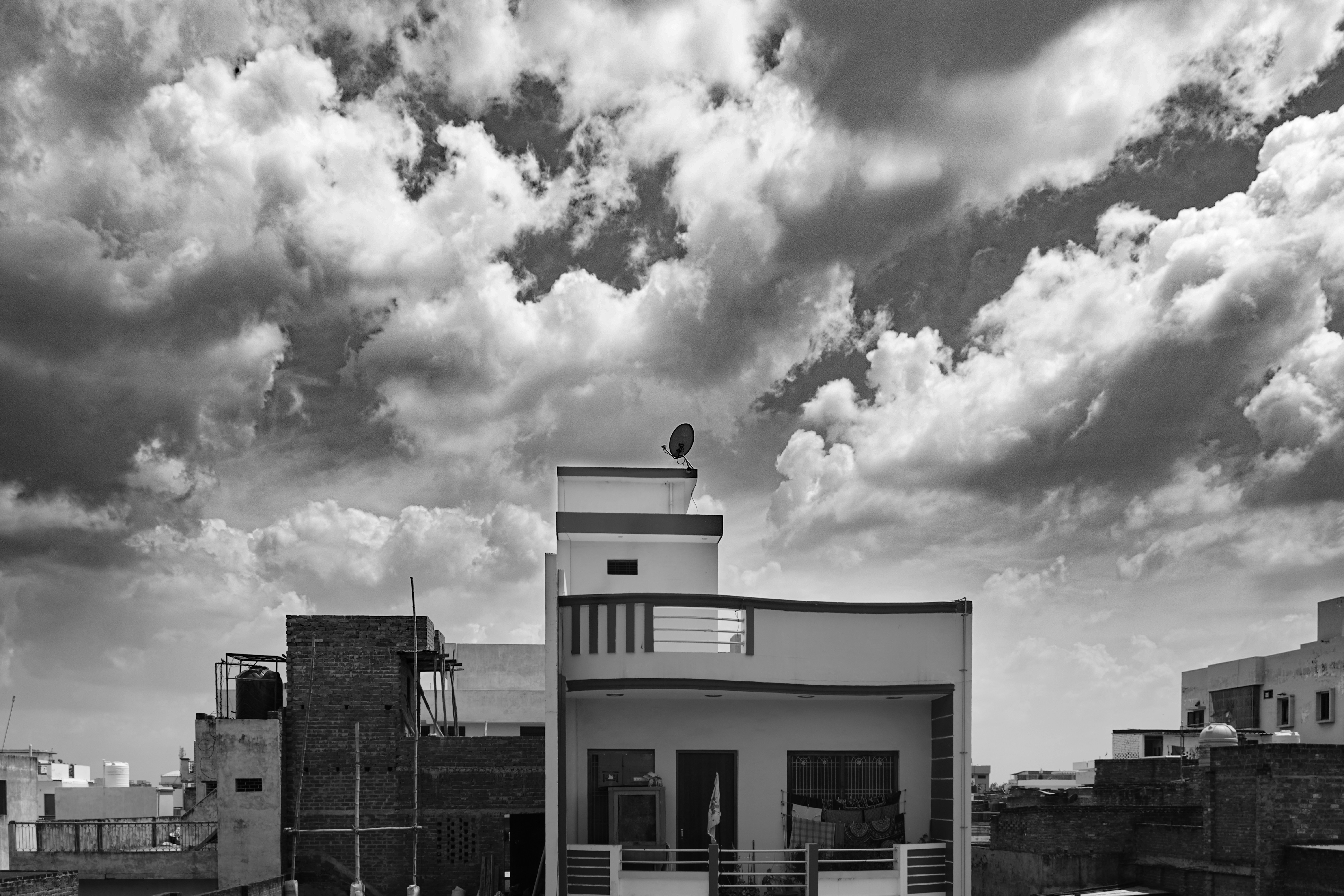 Urban Rooftop Silence Under Expansive Sky