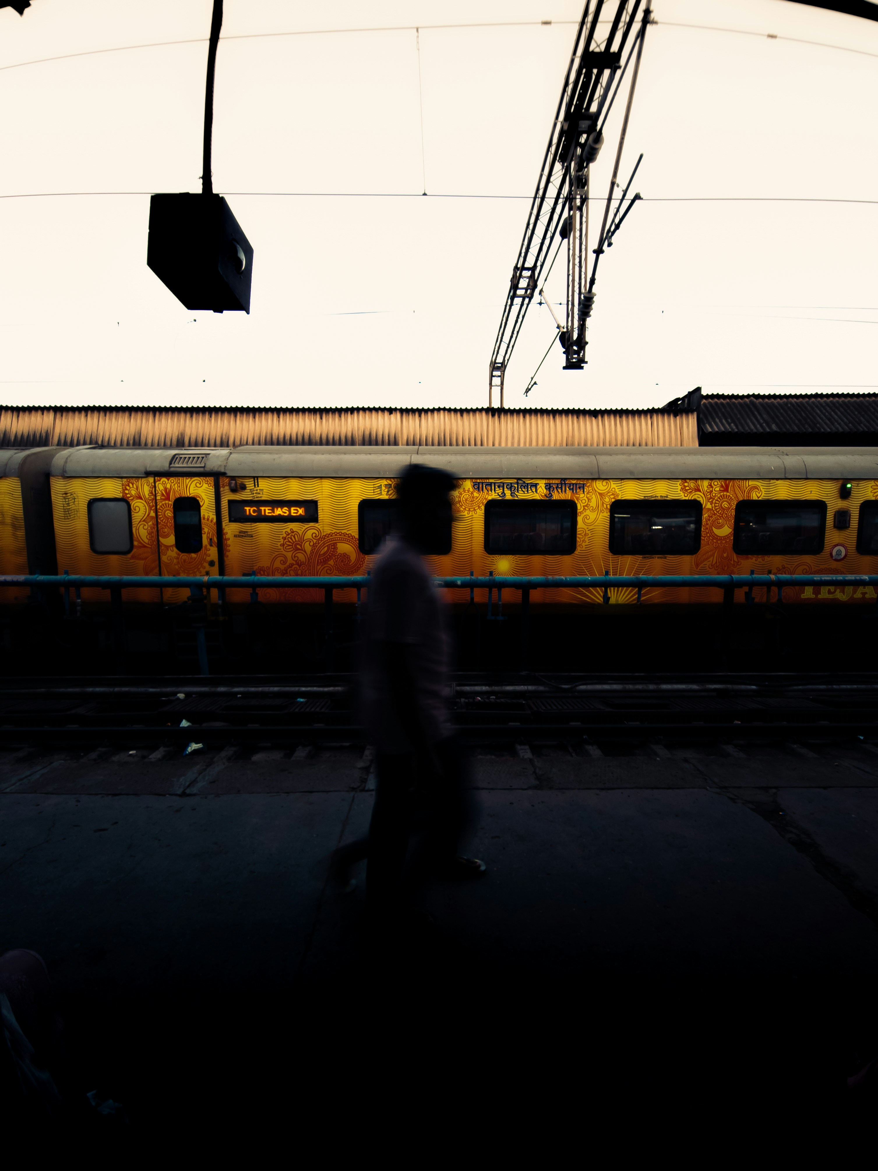 Urban Motion: A Train's Journey Through Shadows