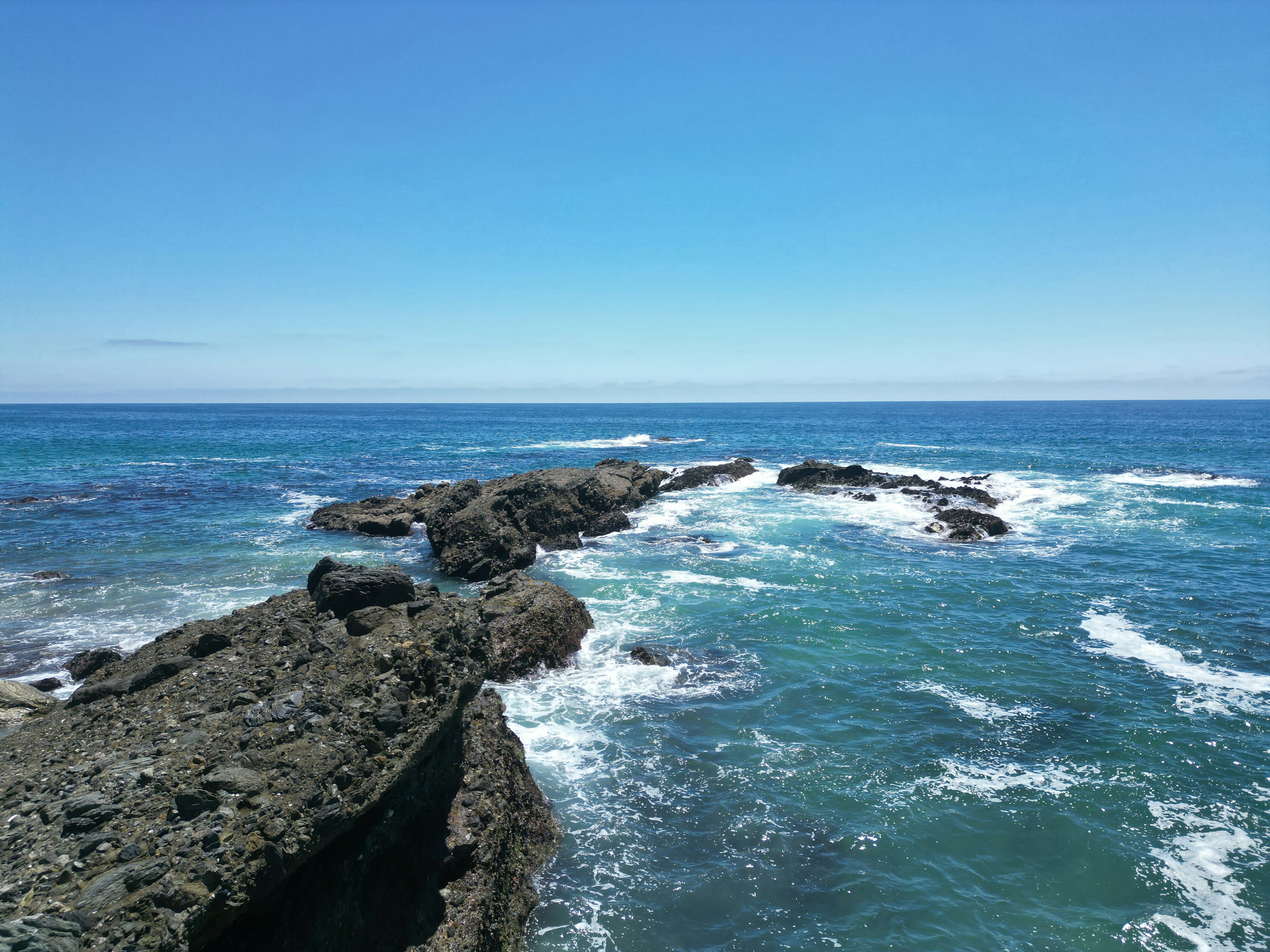 A view of the ocean from a cliff photo – Free Laguna beach Image on ...
