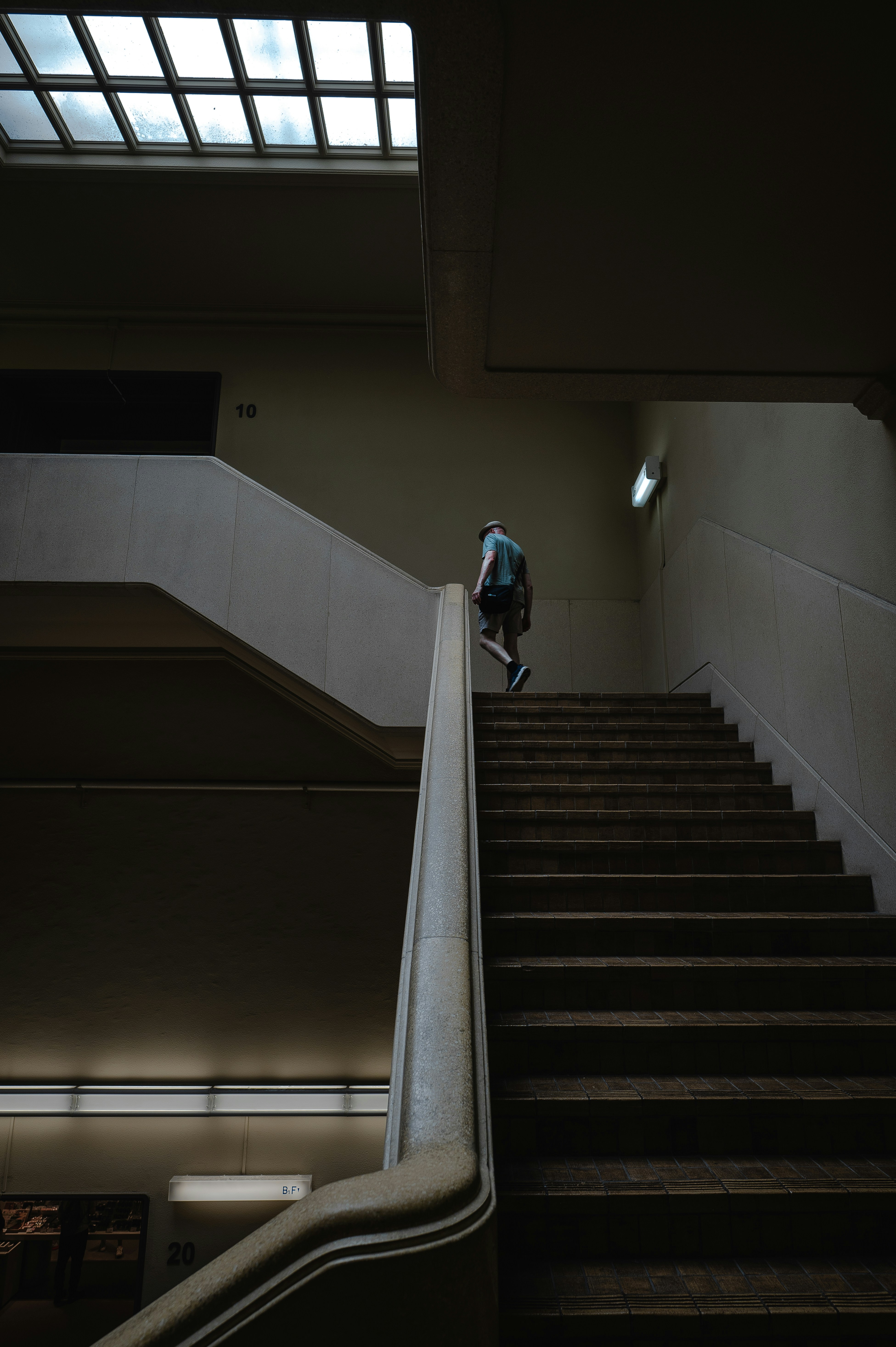 A person walking down a flight of stairs photo – Free Japan Image on ...