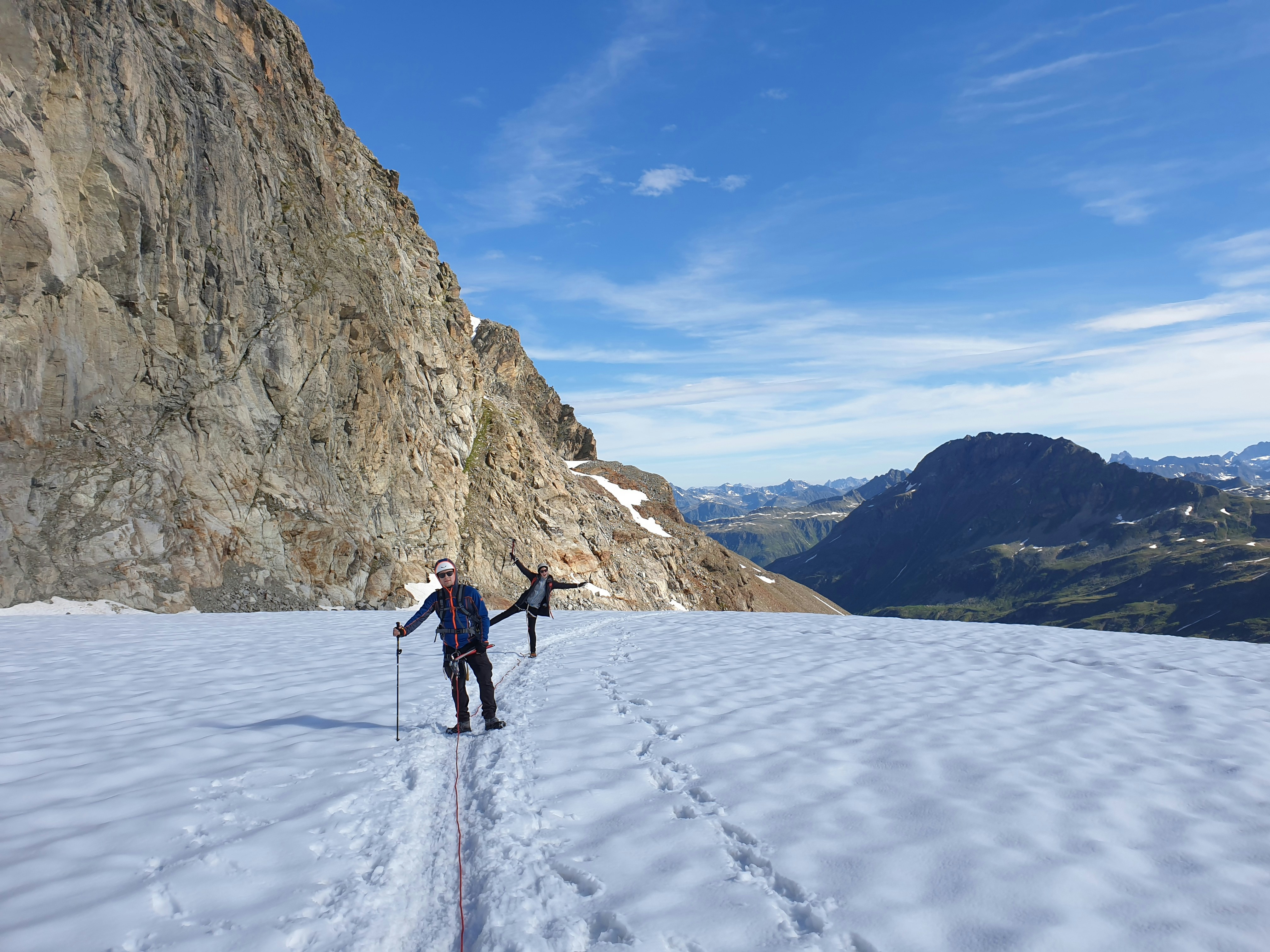 A person walking across a snow covered slope photo – Free Human Image ...