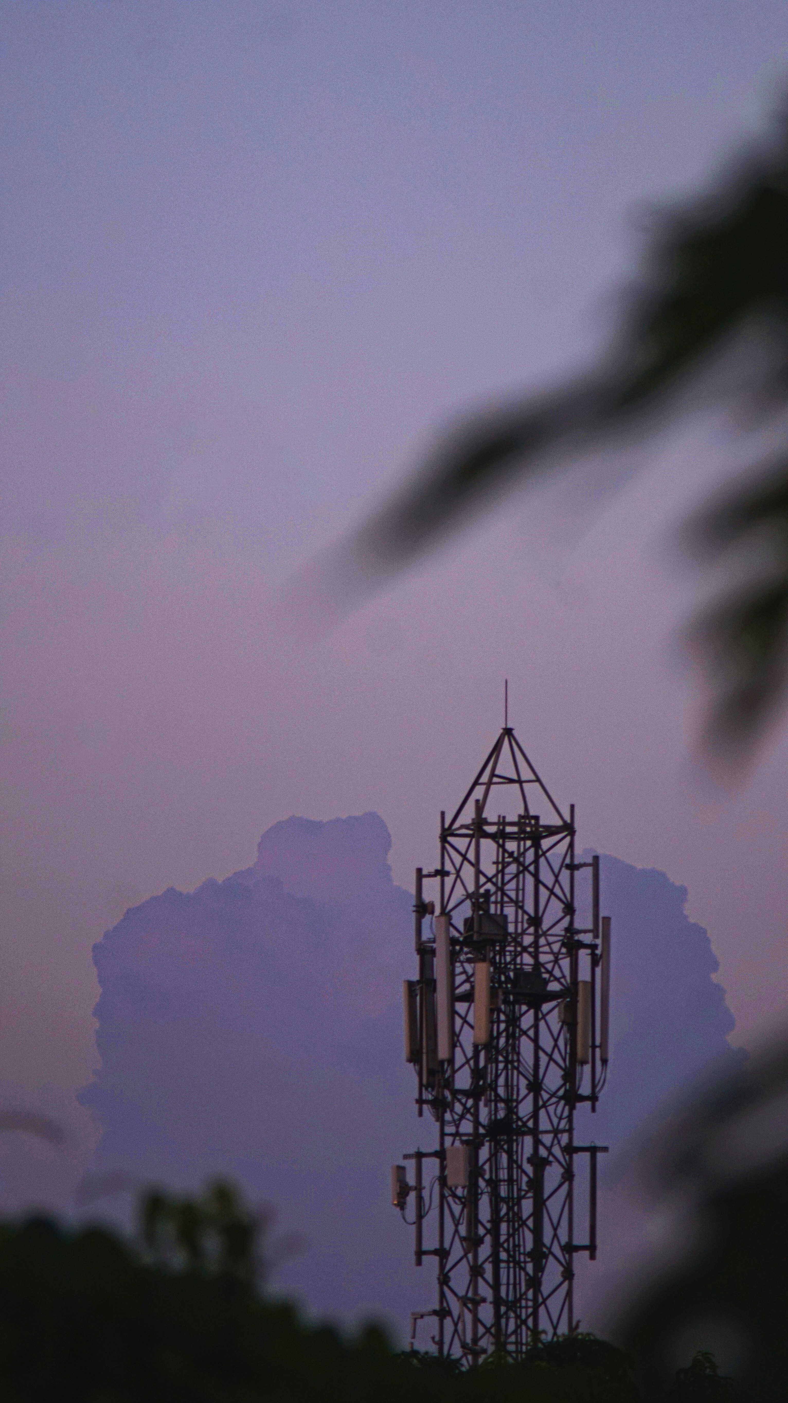 Purple Dusk Lattice: A Communications Tower Against the Violet Sky