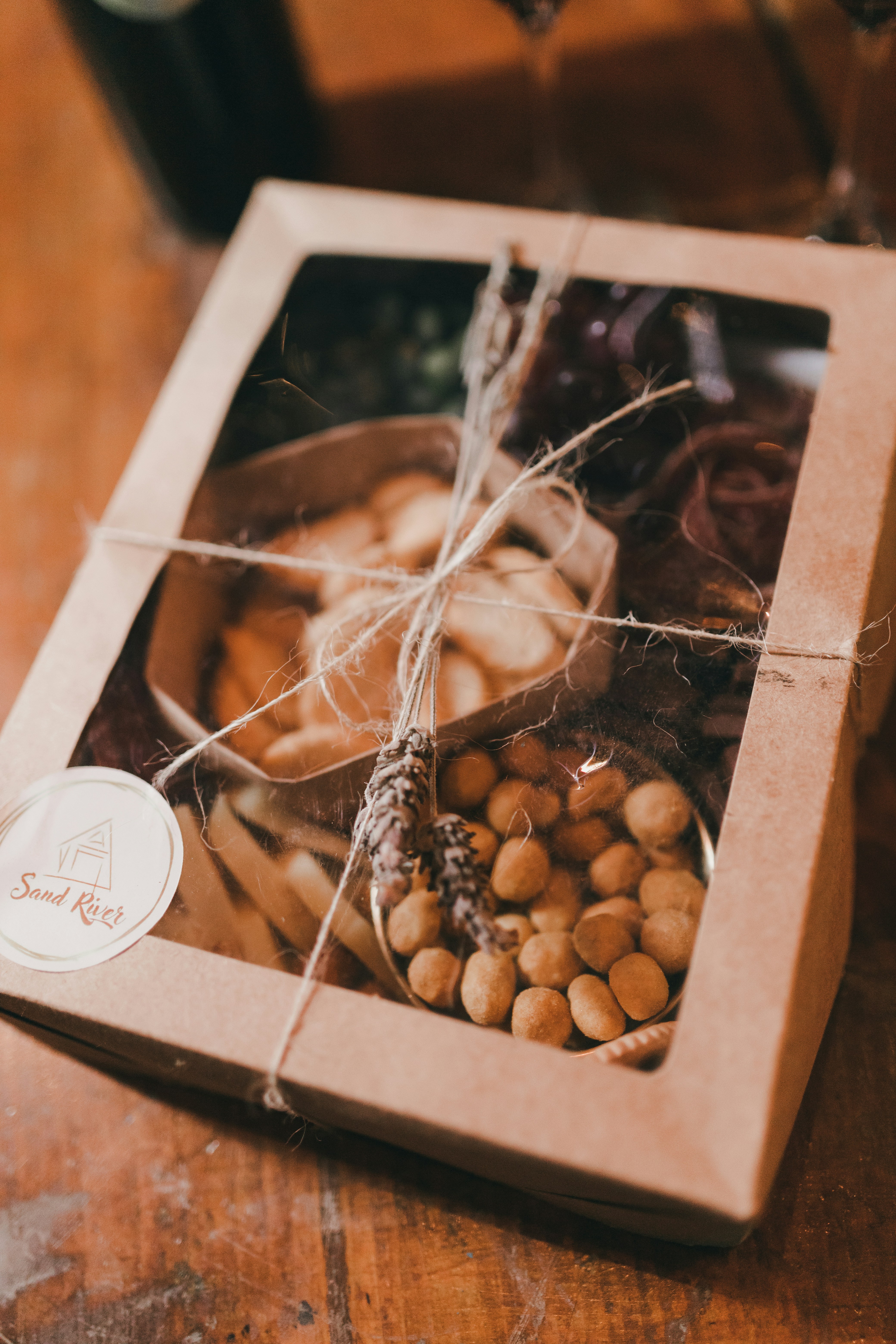 A box of food sitting on top of a wooden table photo – Free Photo frame ...