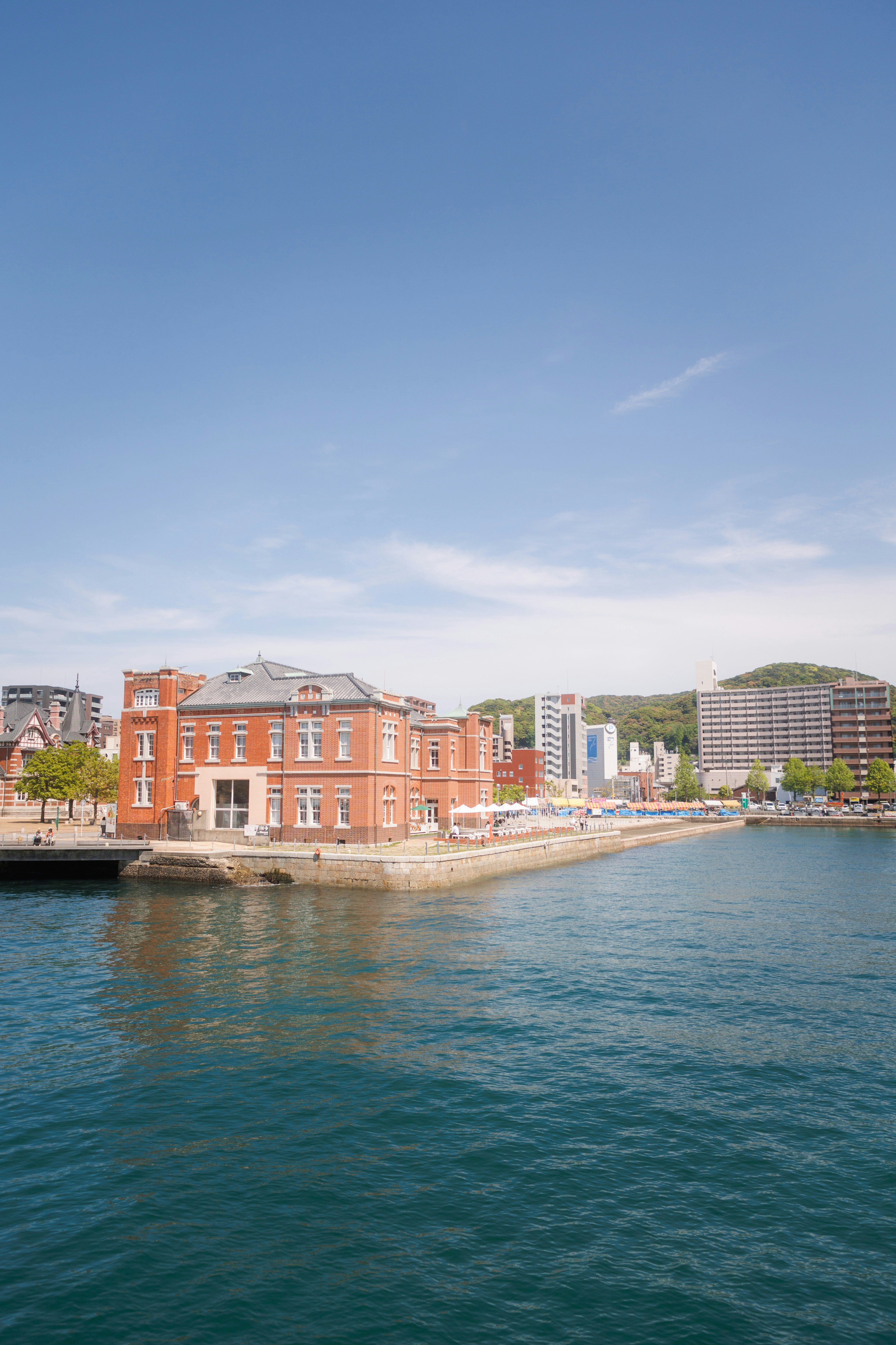 Red Brick on the Pier: A Quiet Harbor Under a Cerulean Sky