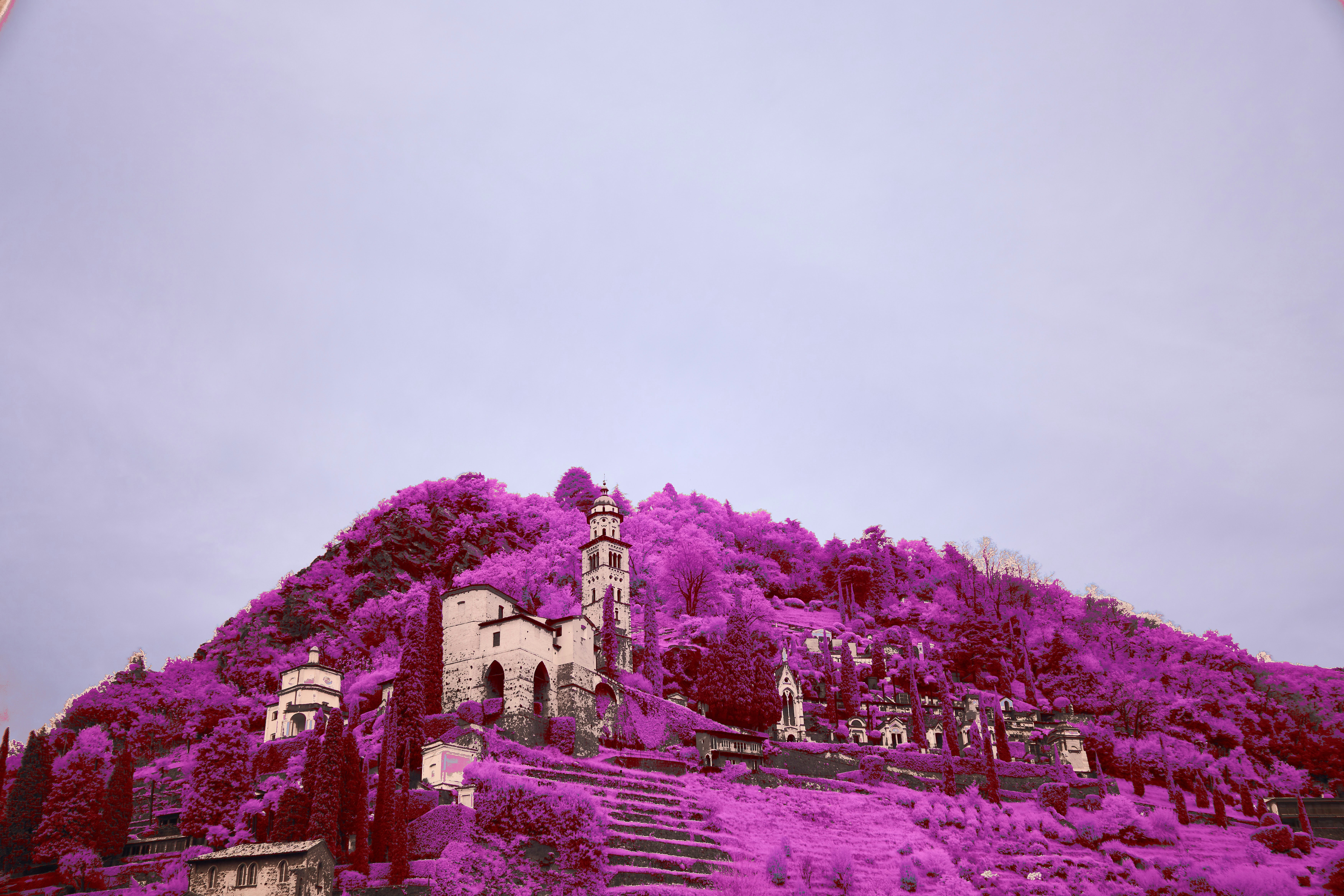 A large hill with a building on top of it photo – Free Building Image ...