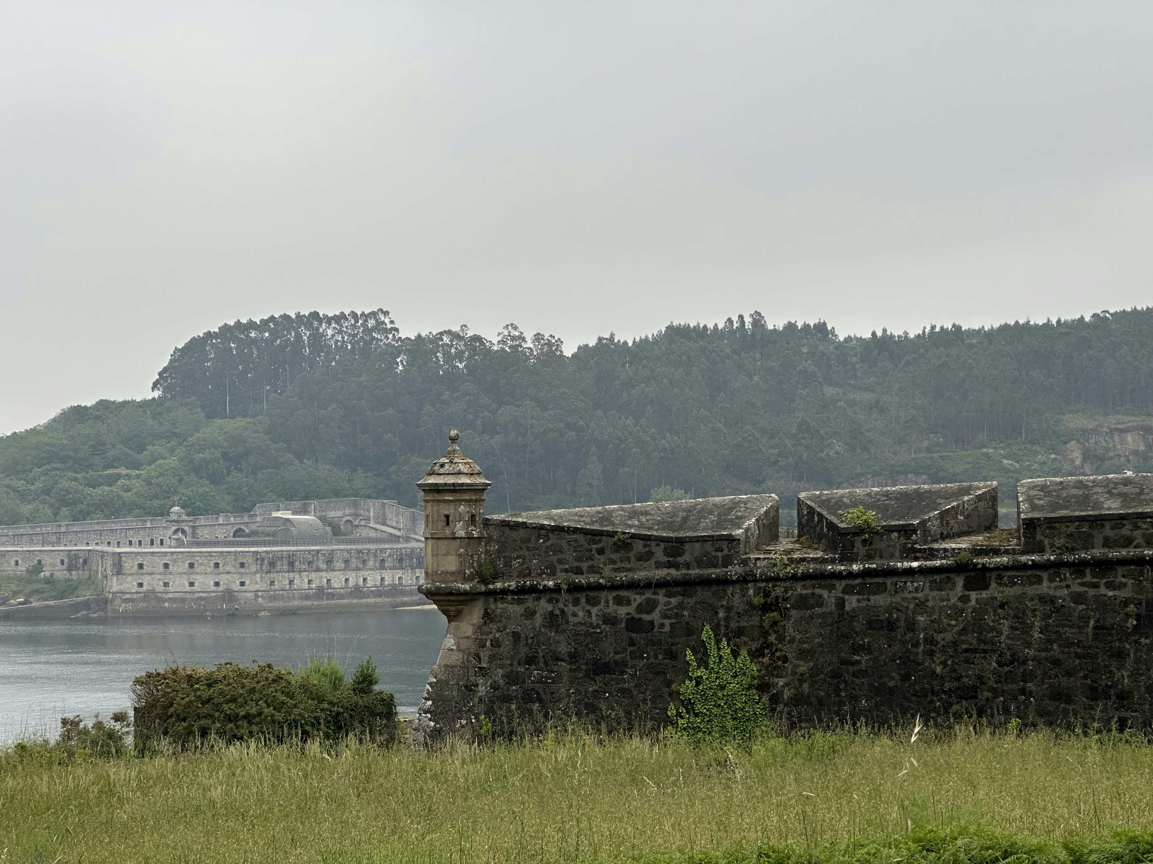 Stone Sentinel by the Quiet River in Gray Light