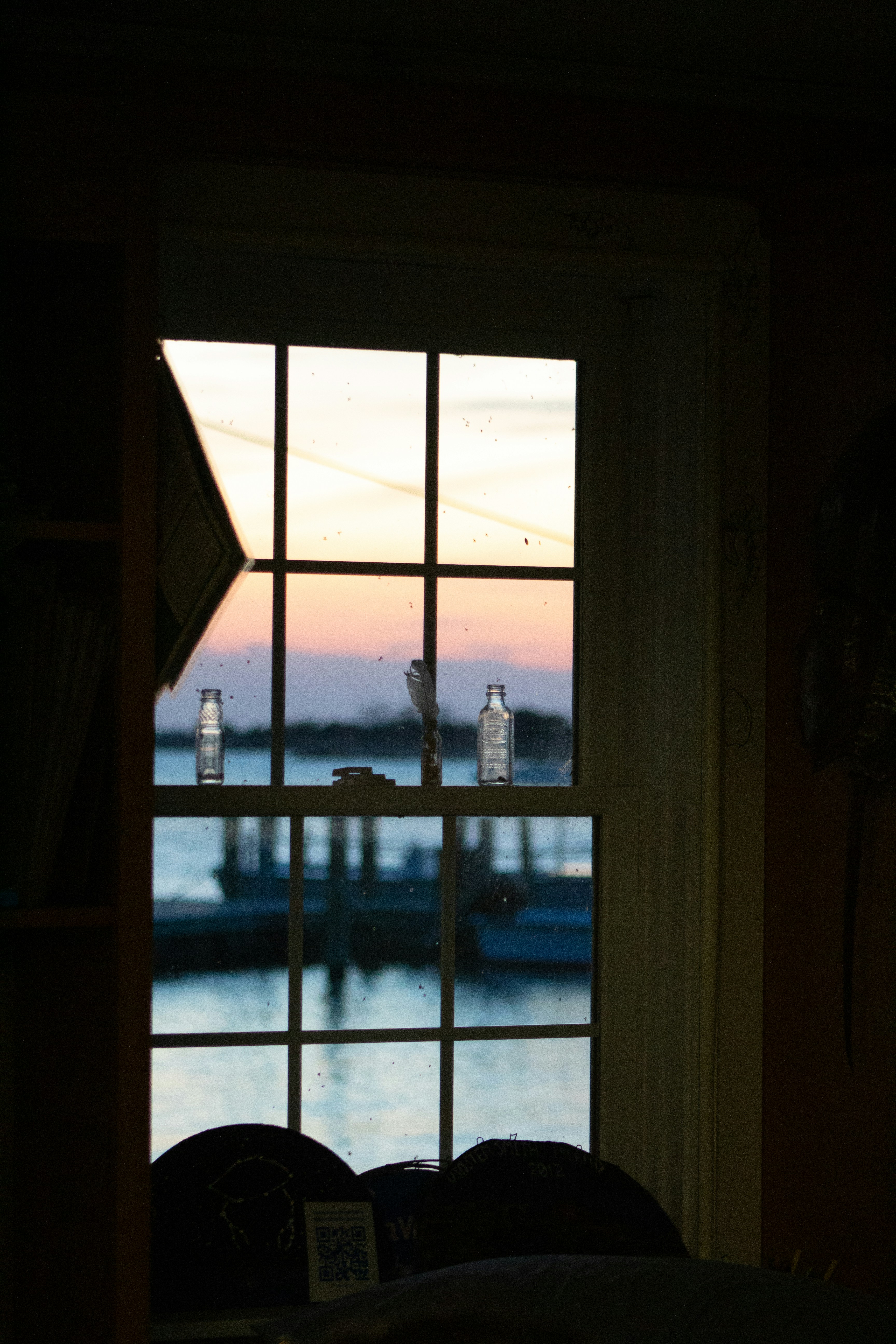 A window with a view of the water outside photo – Free Wallpaper for ...