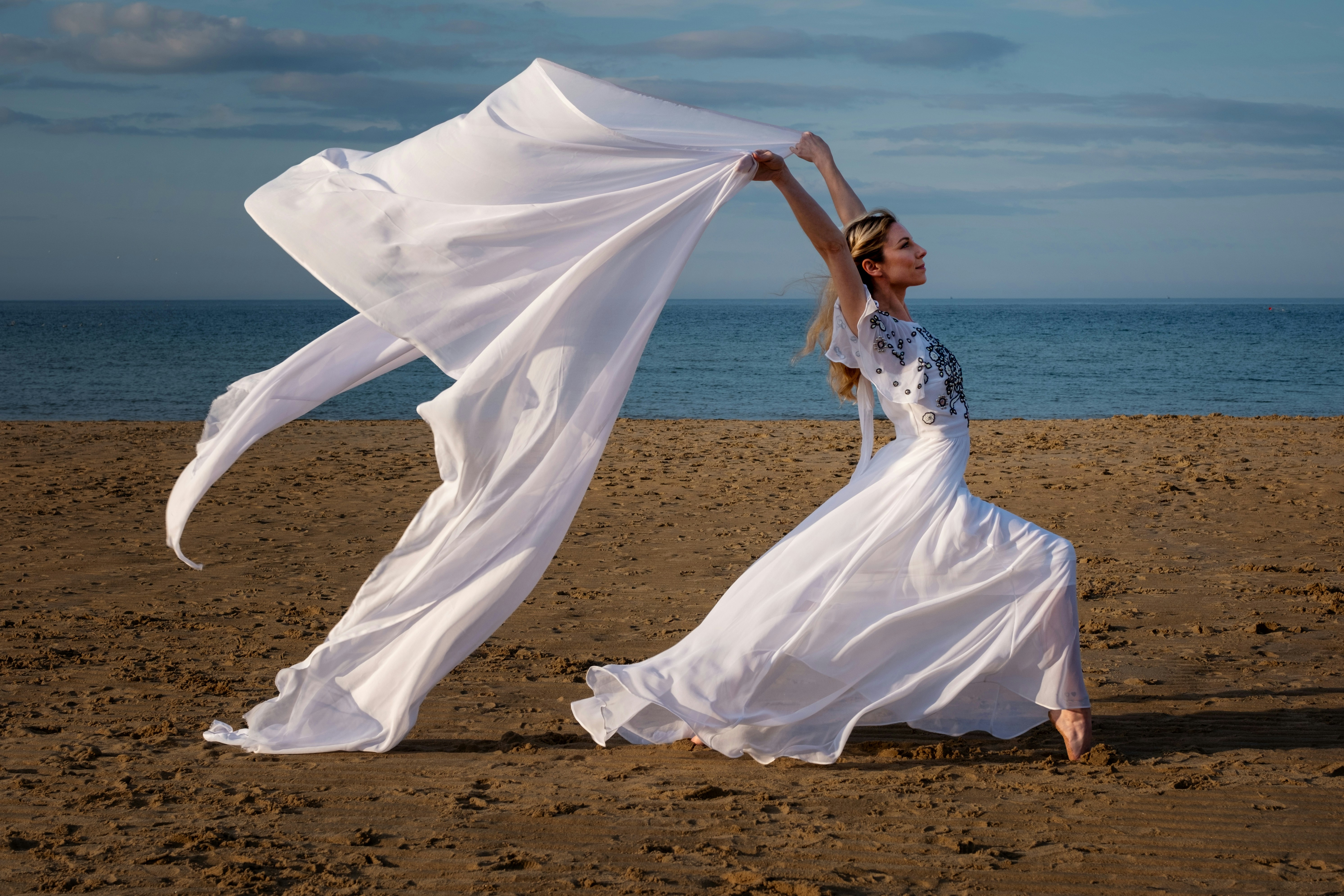 Silk in the Sea Breeze: A Bride's Shorefront Dance