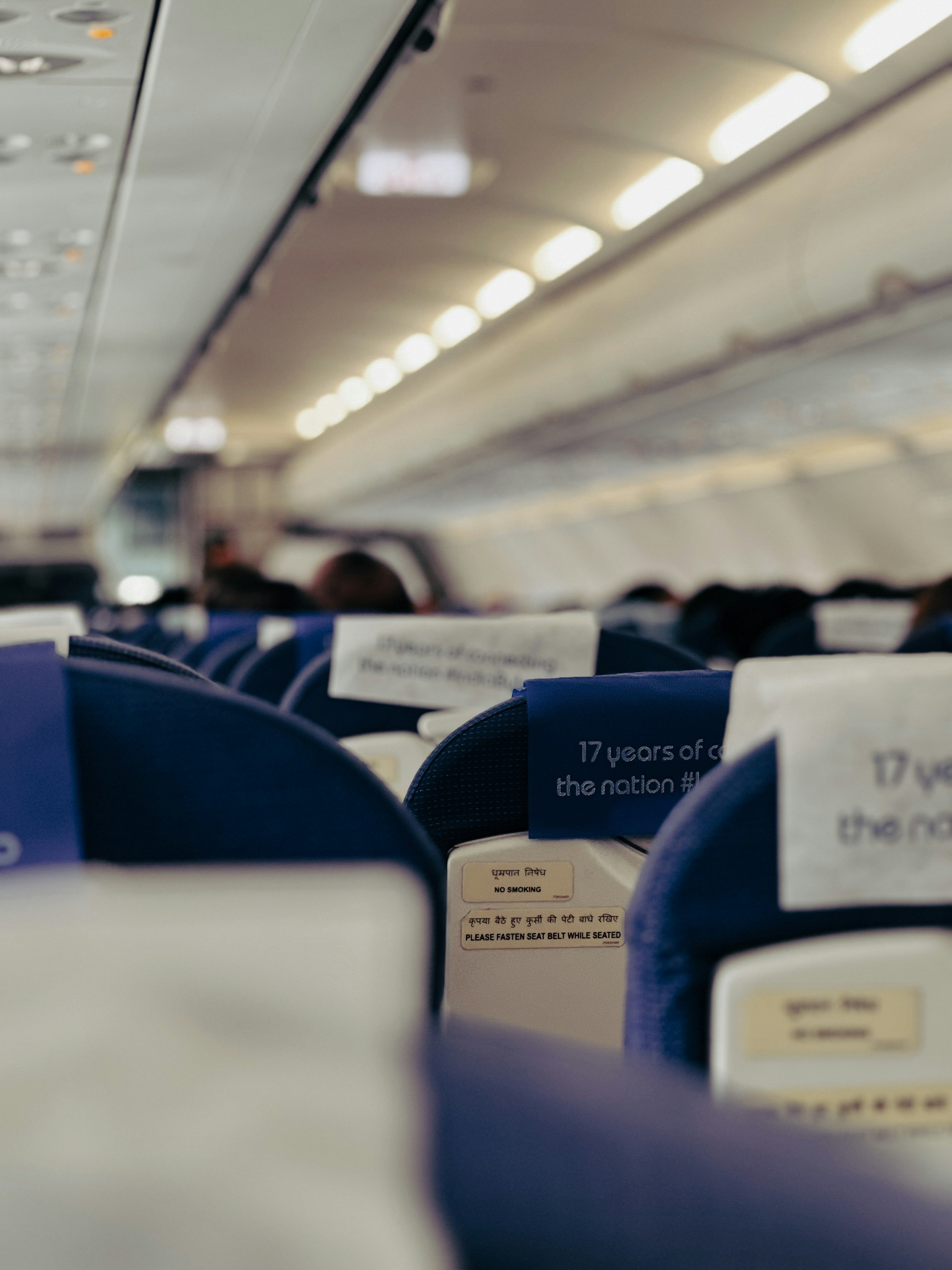 Muted Aisle: Texture and Light in a Quiet Airplane CabinVishnu Kalanad