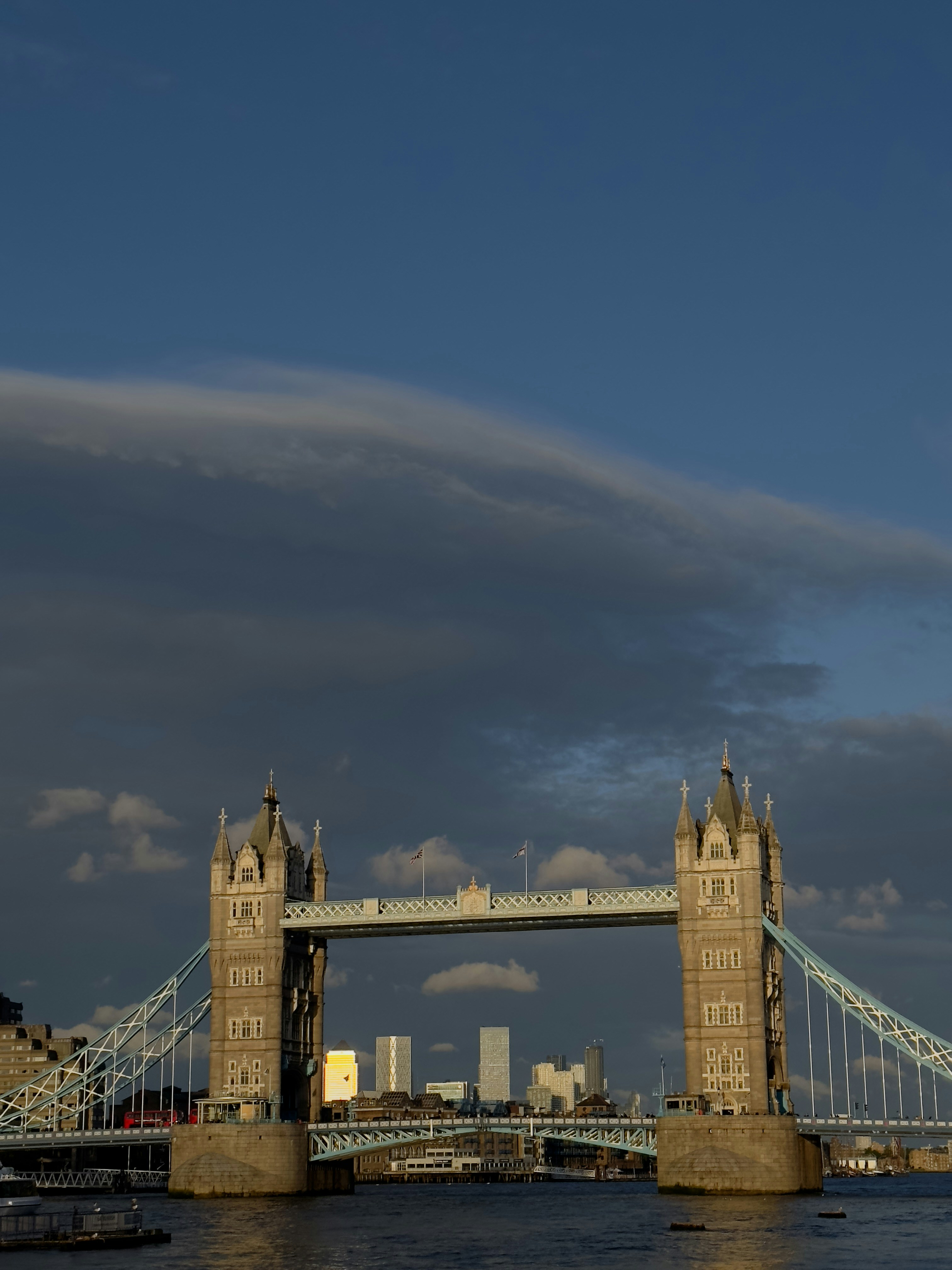 Tower Bridge: dual towers spanning the Thames beneath a calm, cobalt sky