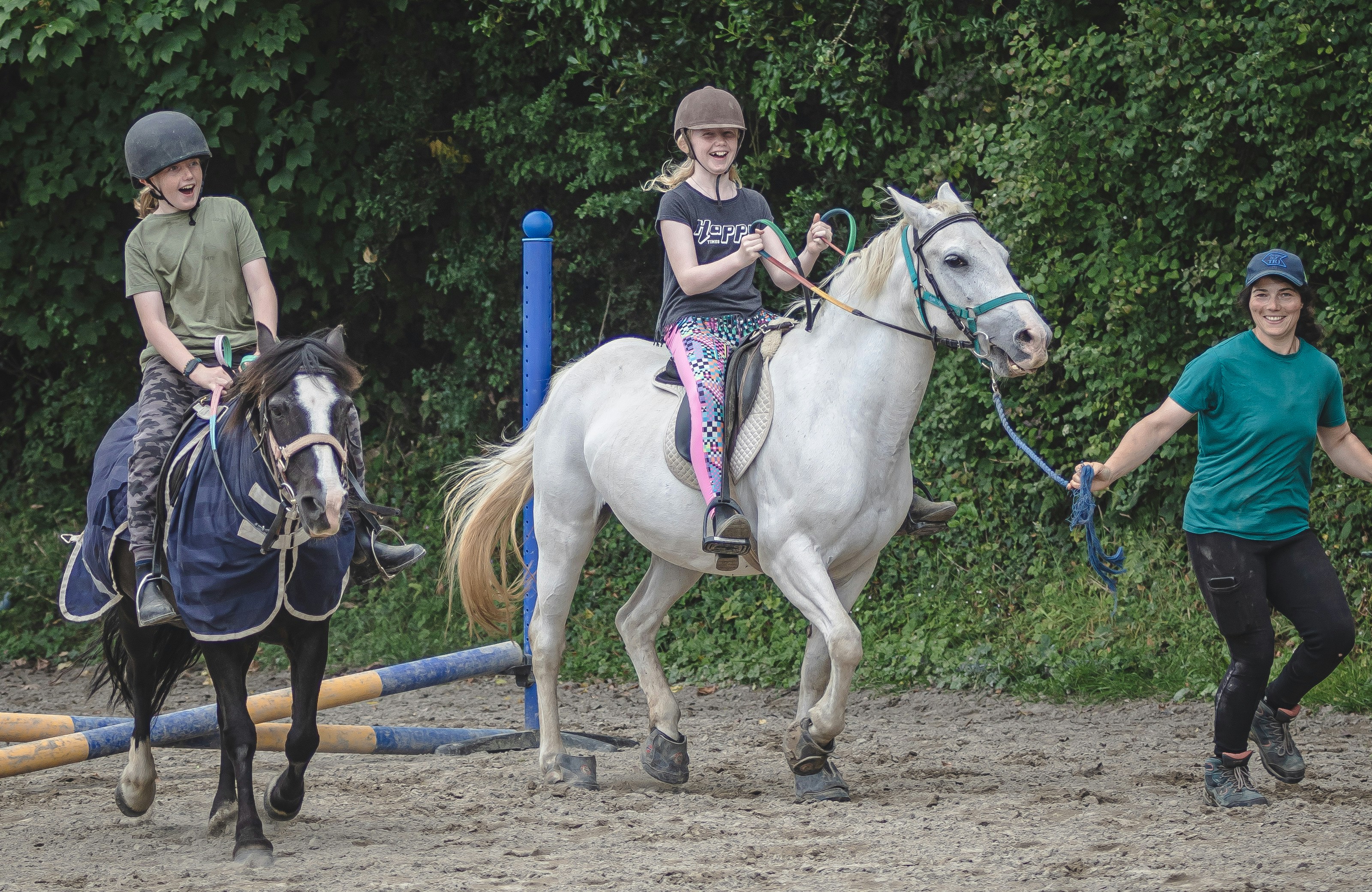 A group of people riding on the backs of horses photo – Free Ireland ...