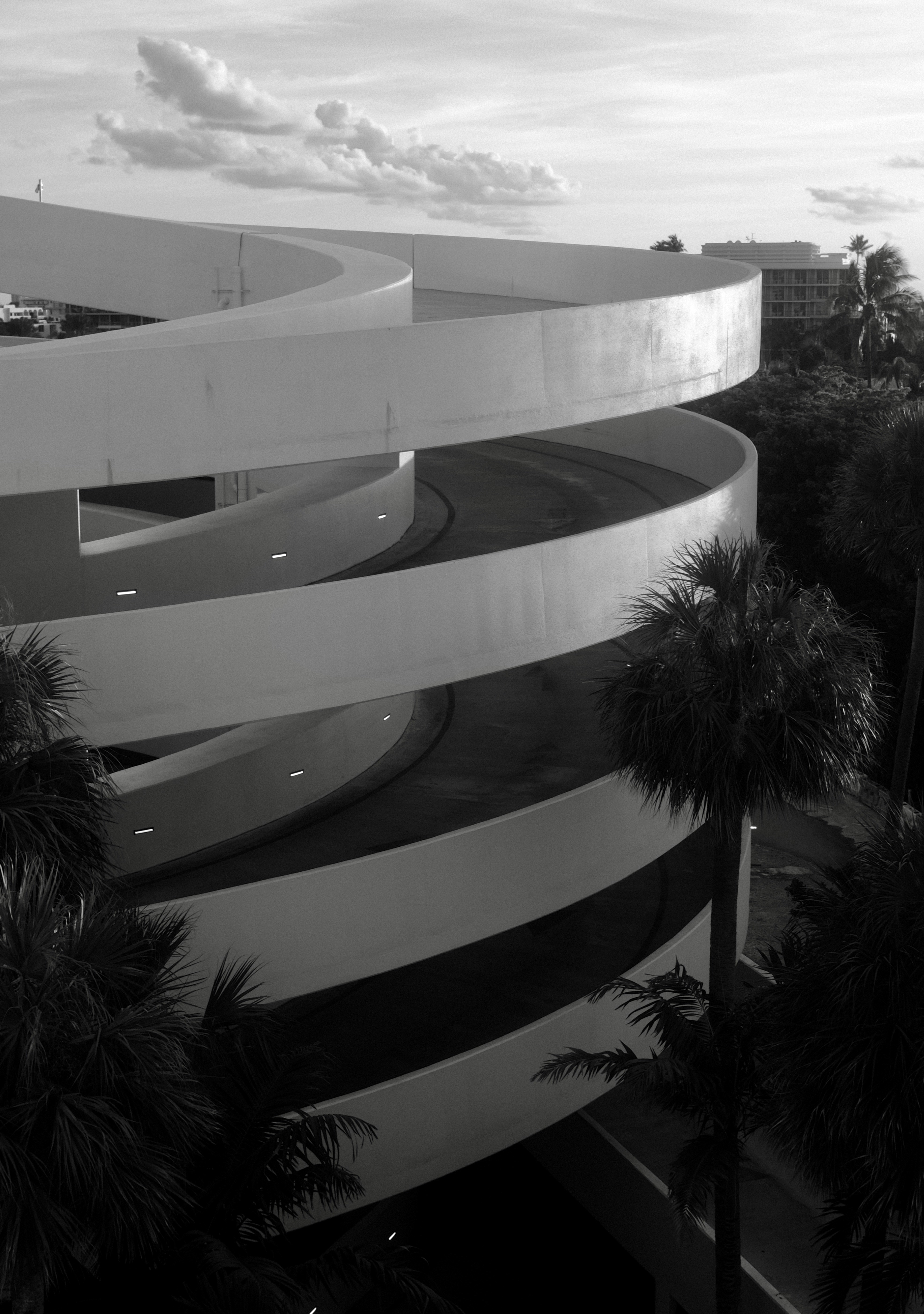 Monochrome Spiral: The Concrete Carousel of a Hidden Parking Ramp
