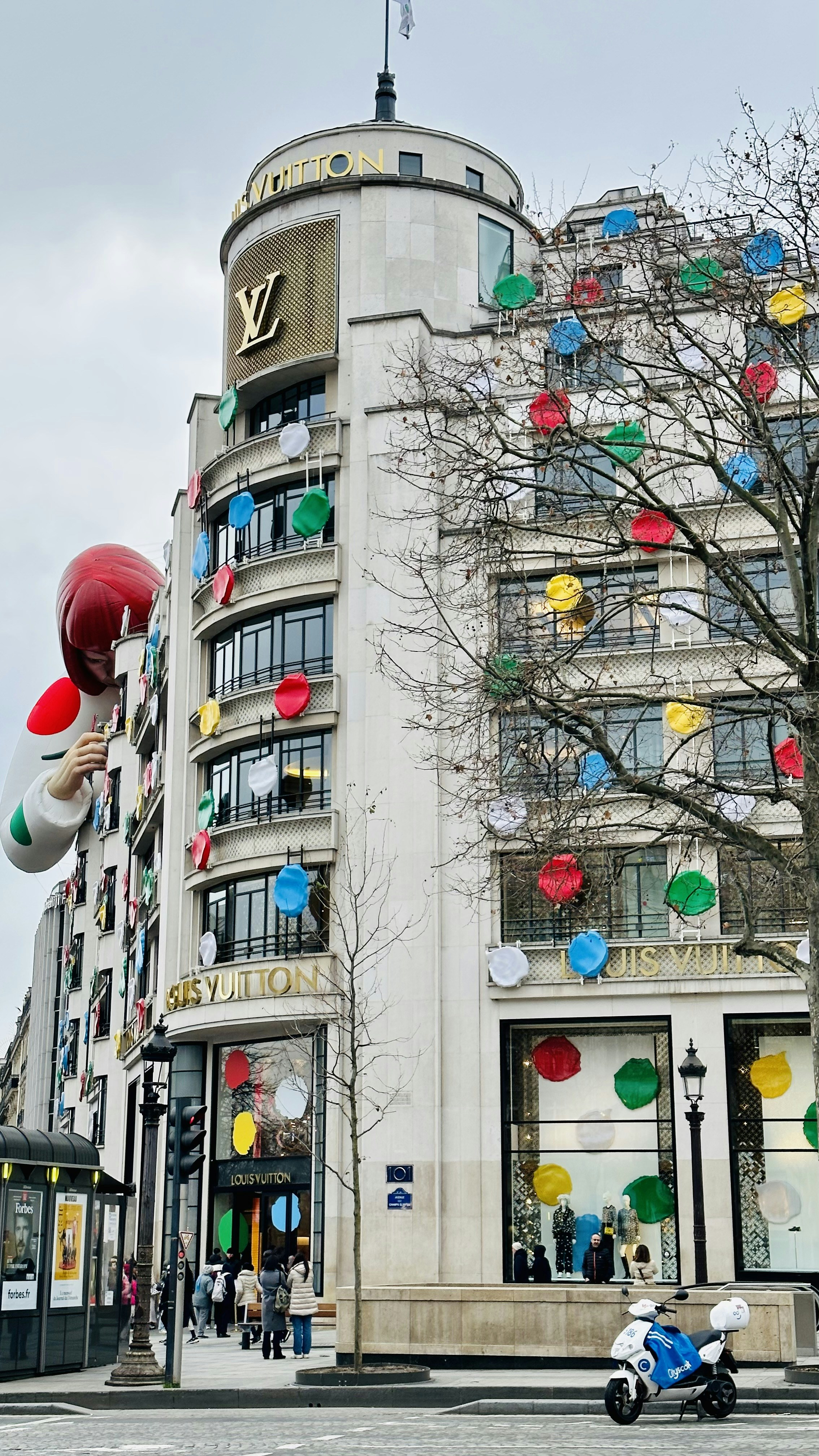 Colorful Orbs Crown a Louis Vuitton Facade on a City Street