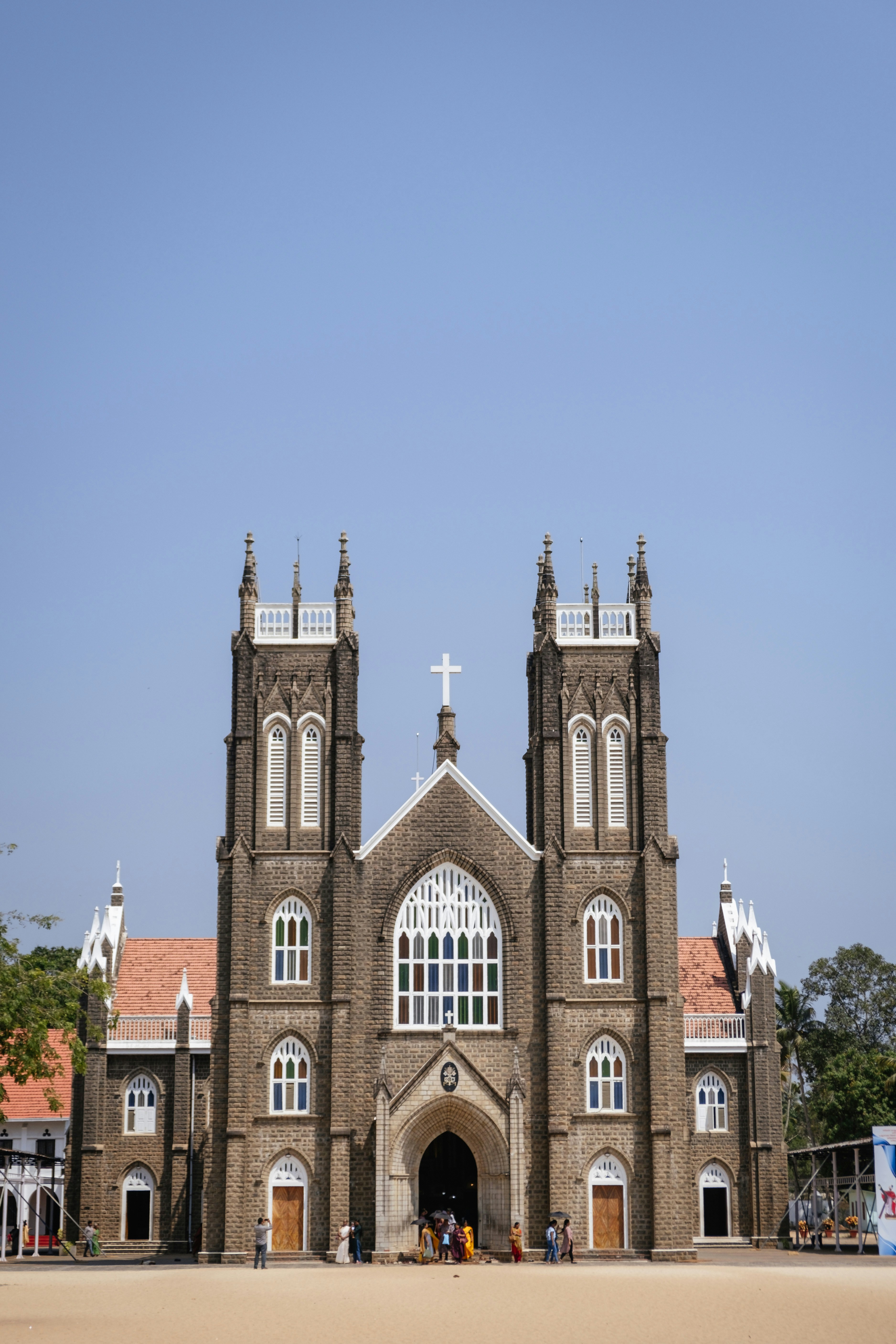 Symmetry Under the Cross: Brick-Gothic Church with Twin Towers