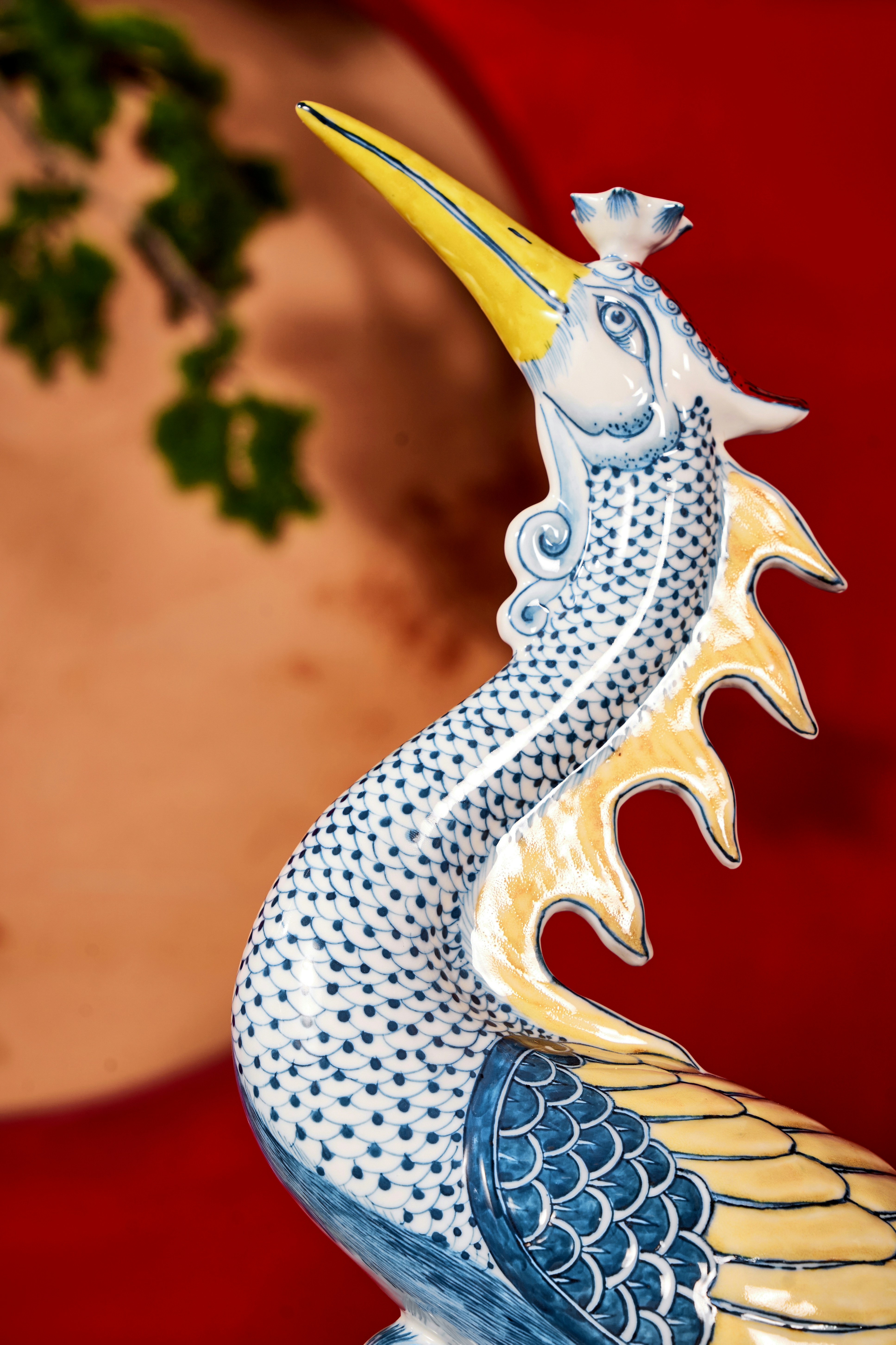 Blue-Scaled Dragon Rising: Hand-Painted Ceramic Statuette Against Crimson Backdrop