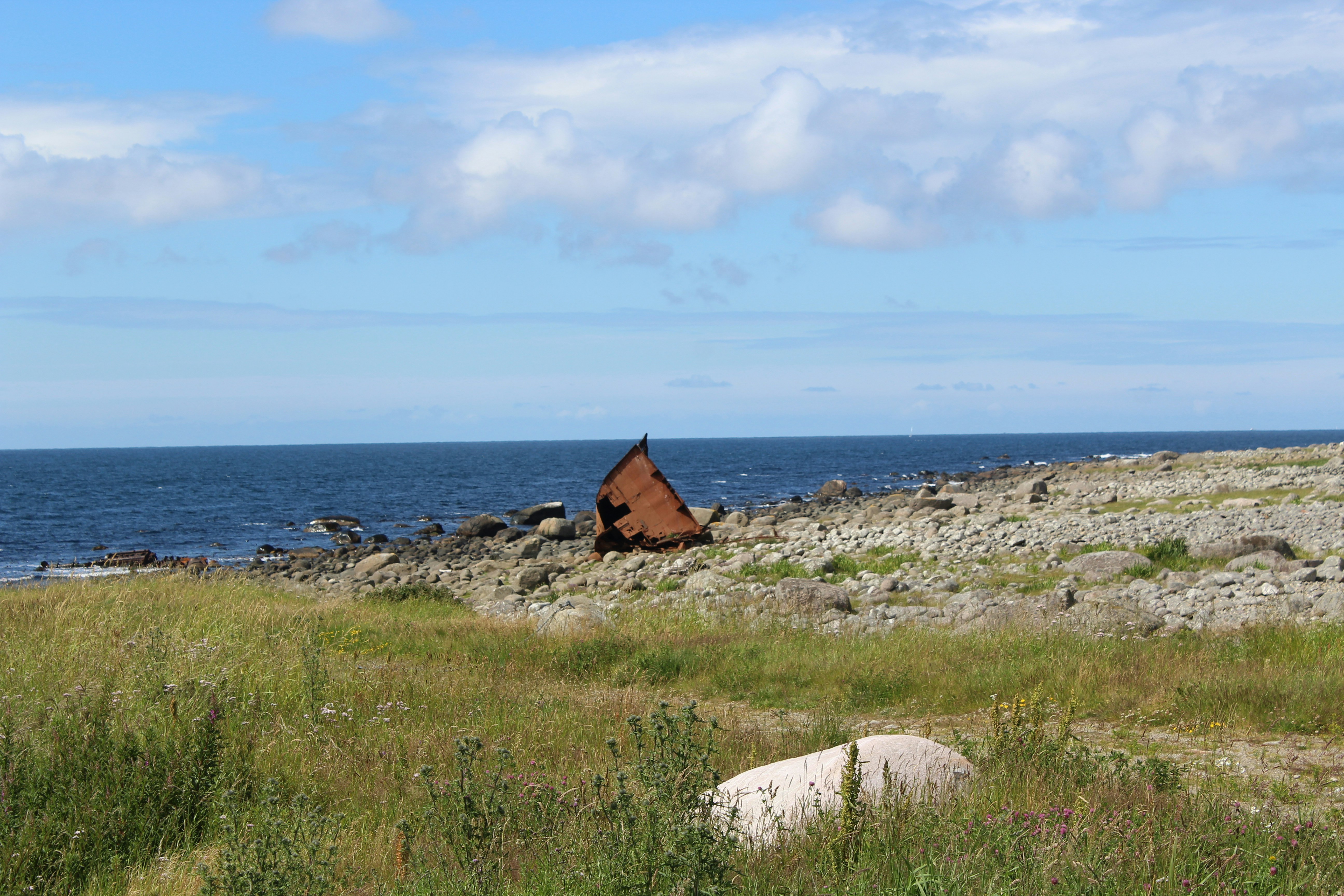 Rusted Sentinel by the Sea: A Quiet Coastal Relic