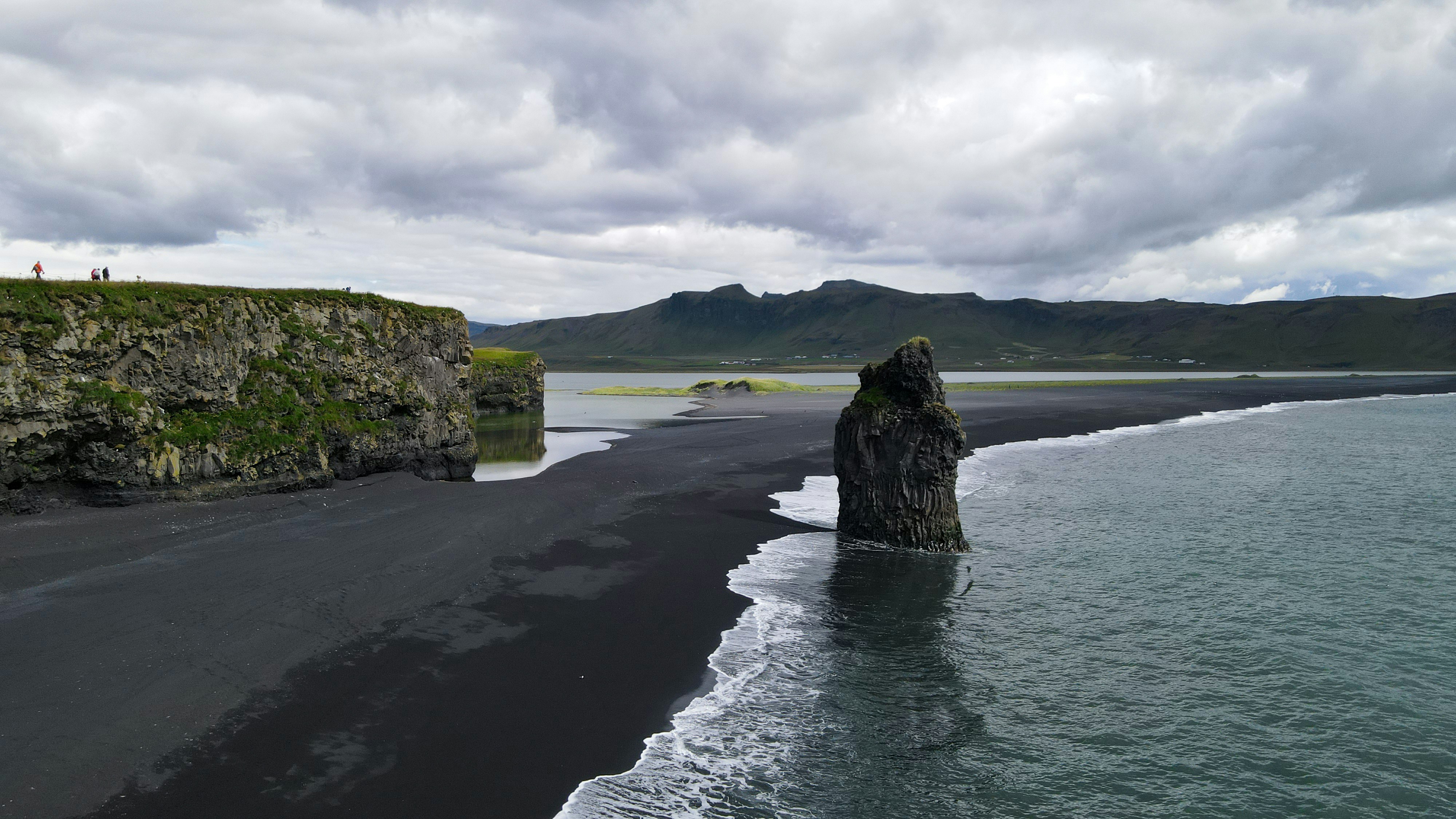 Lone Sea Stack Guarding Iceland's Black-Sand Shore