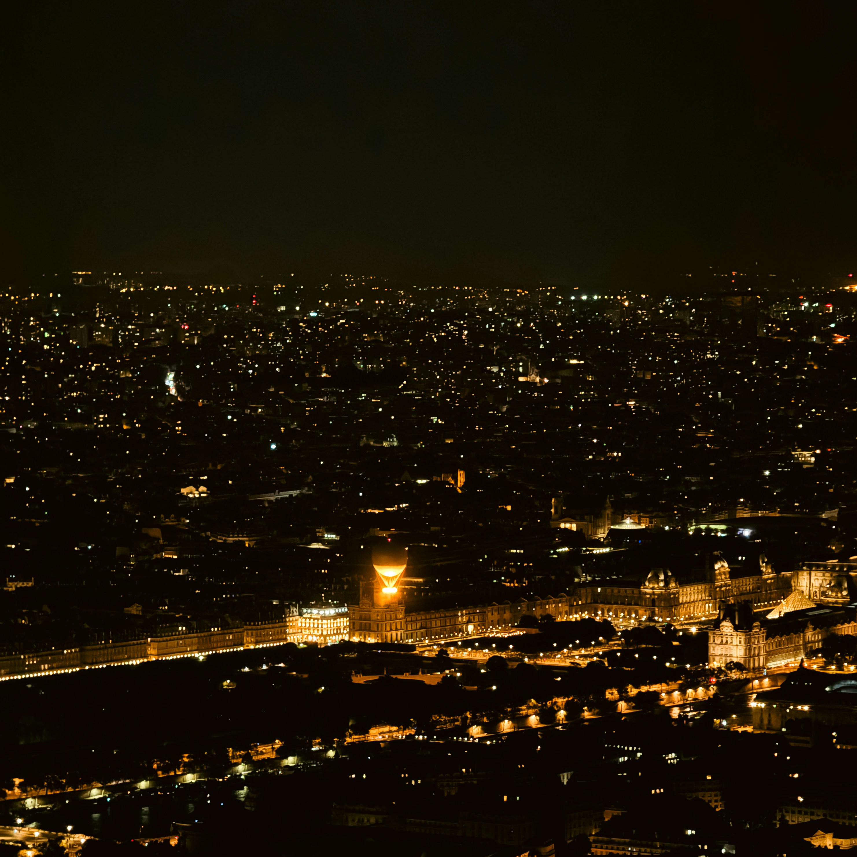 Illuminated Urban Tapestry: A Night's EmbraceQi Li