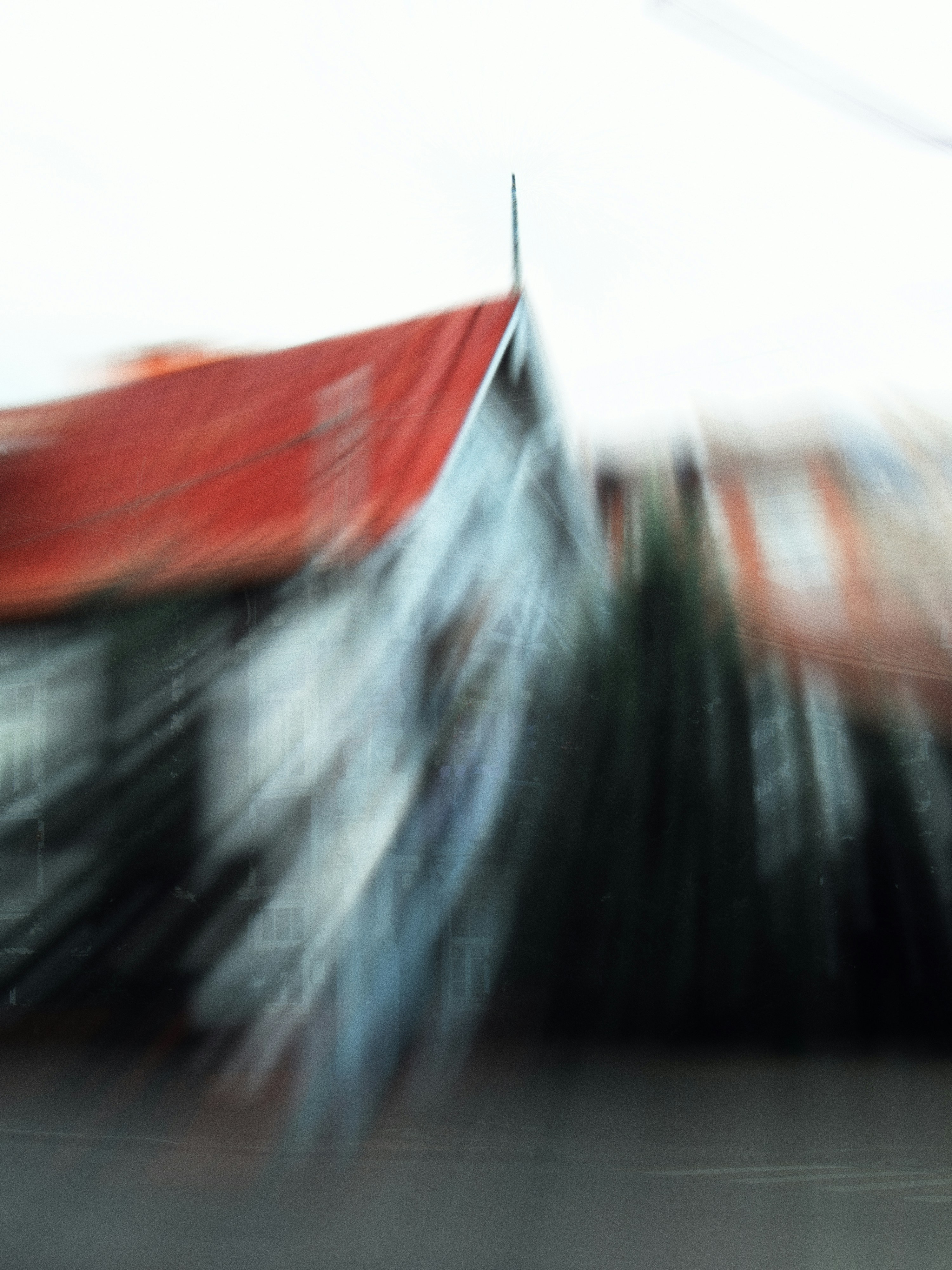Red Roof in a Spin: A Tilted Street Scene