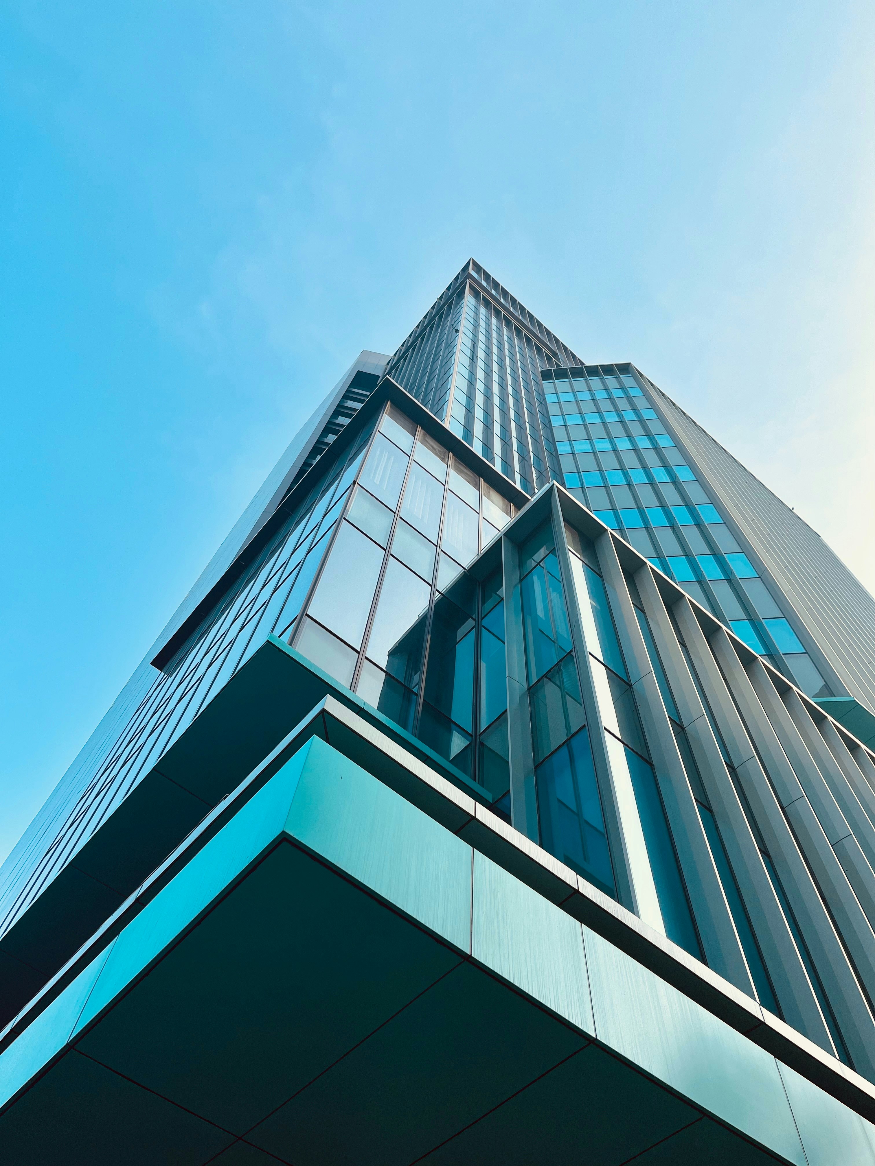 A tall building with lots of windows on top of it photo – Free Taiwan ...