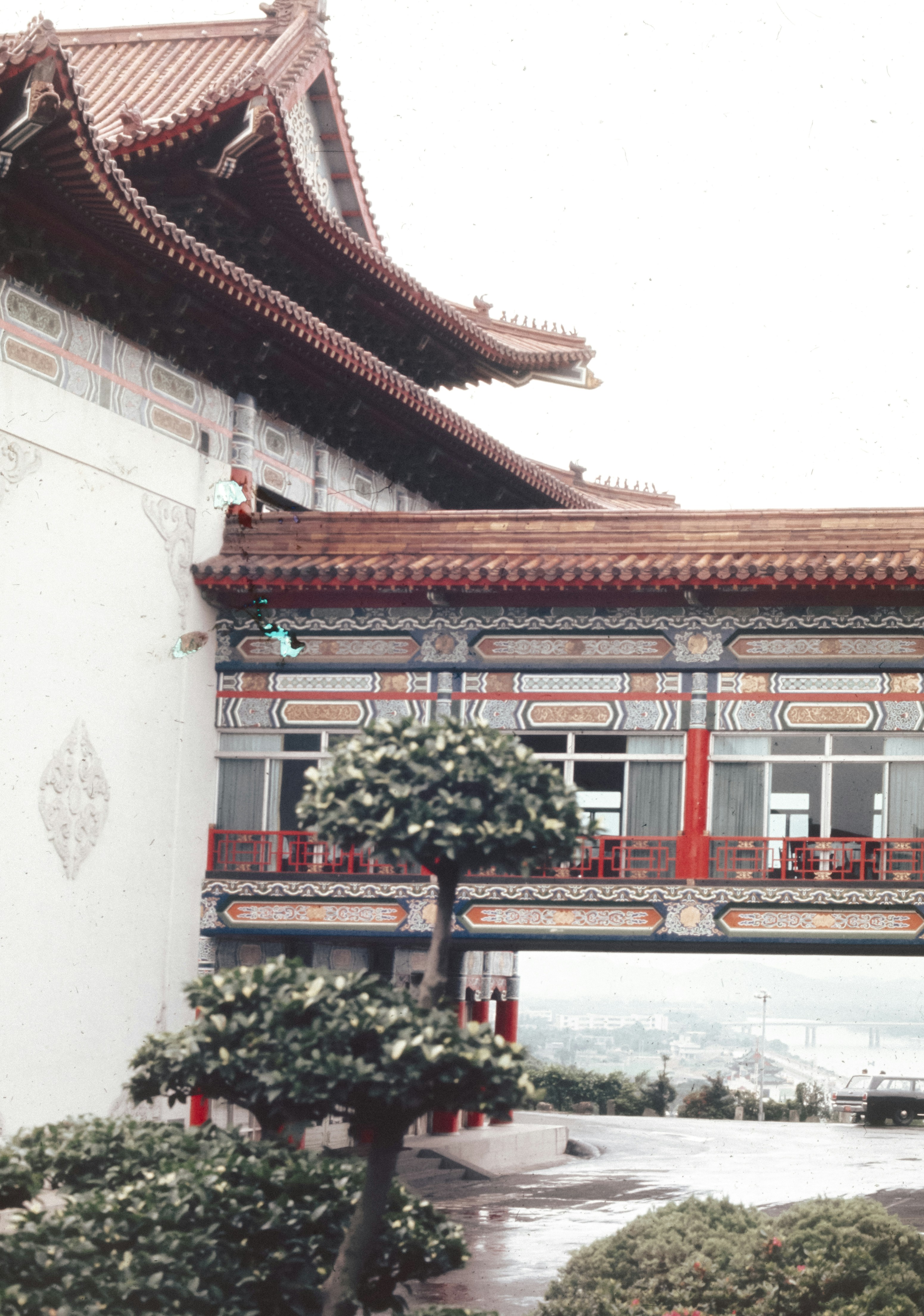 A chinese building with a bridge over it photo – Free 35mm photo Image ...