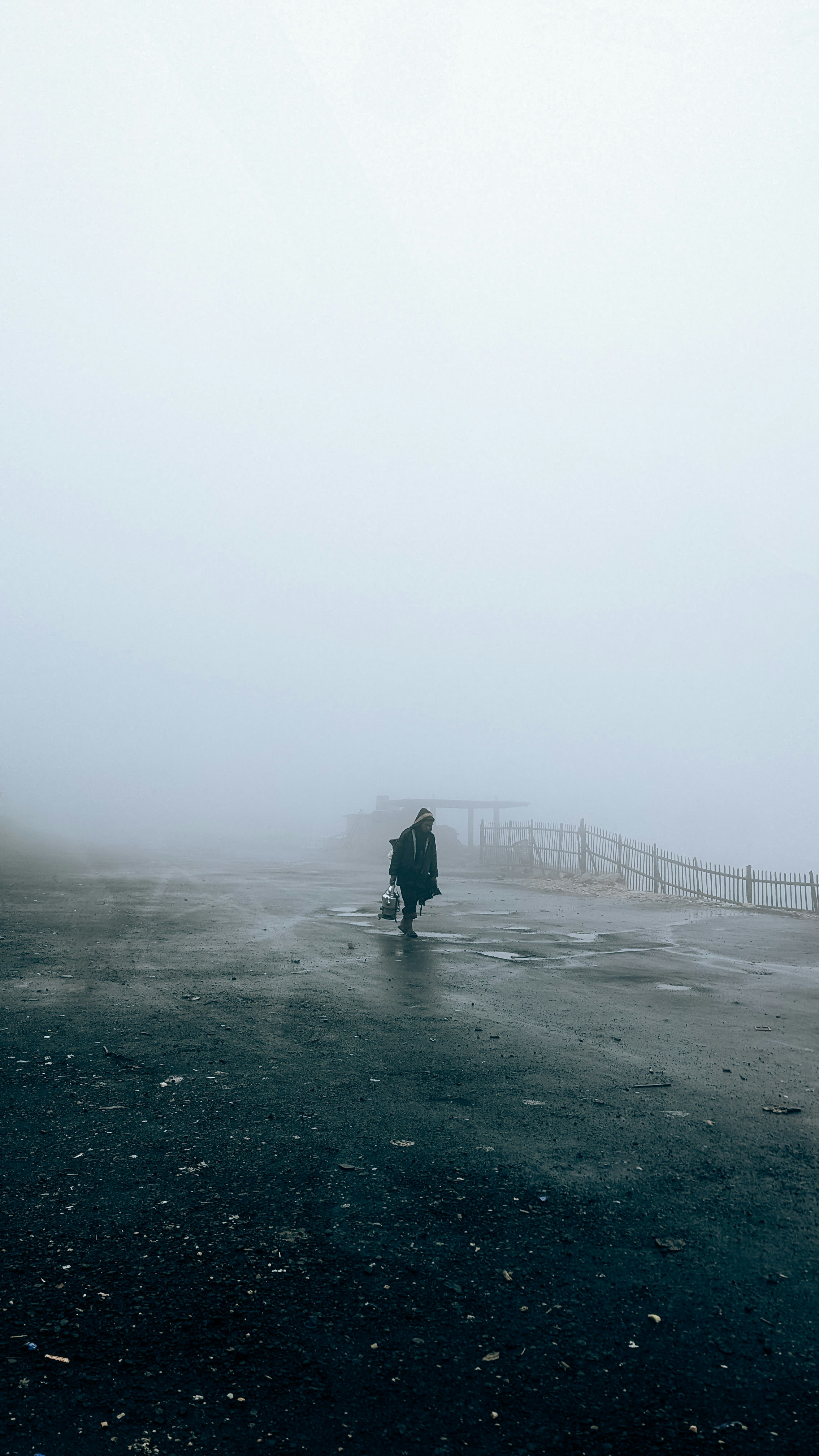A person walking on a road in the fog photo – Free Meghalaya Image on ...