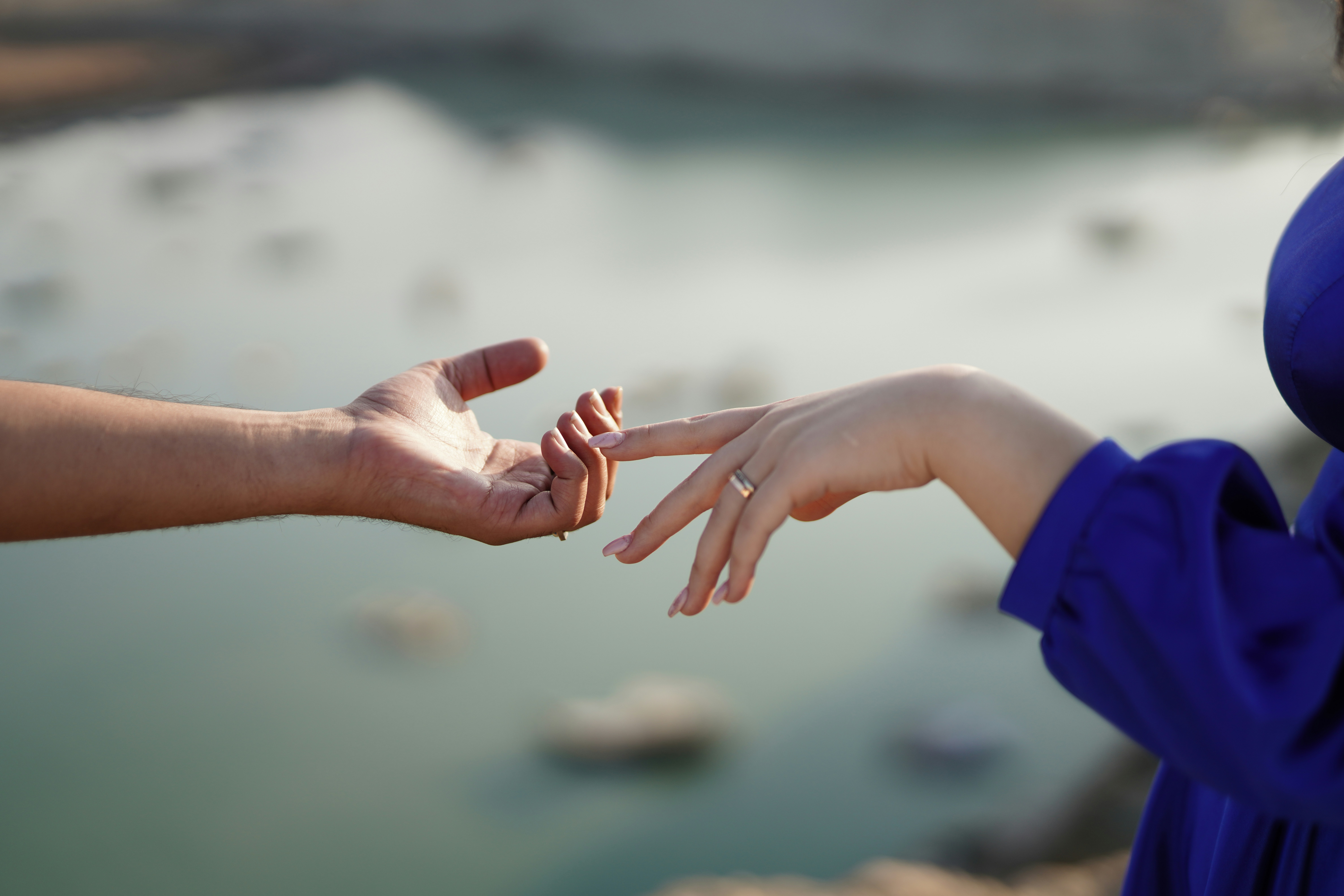 Two people reaching out their hands towards each other photo – Free ...