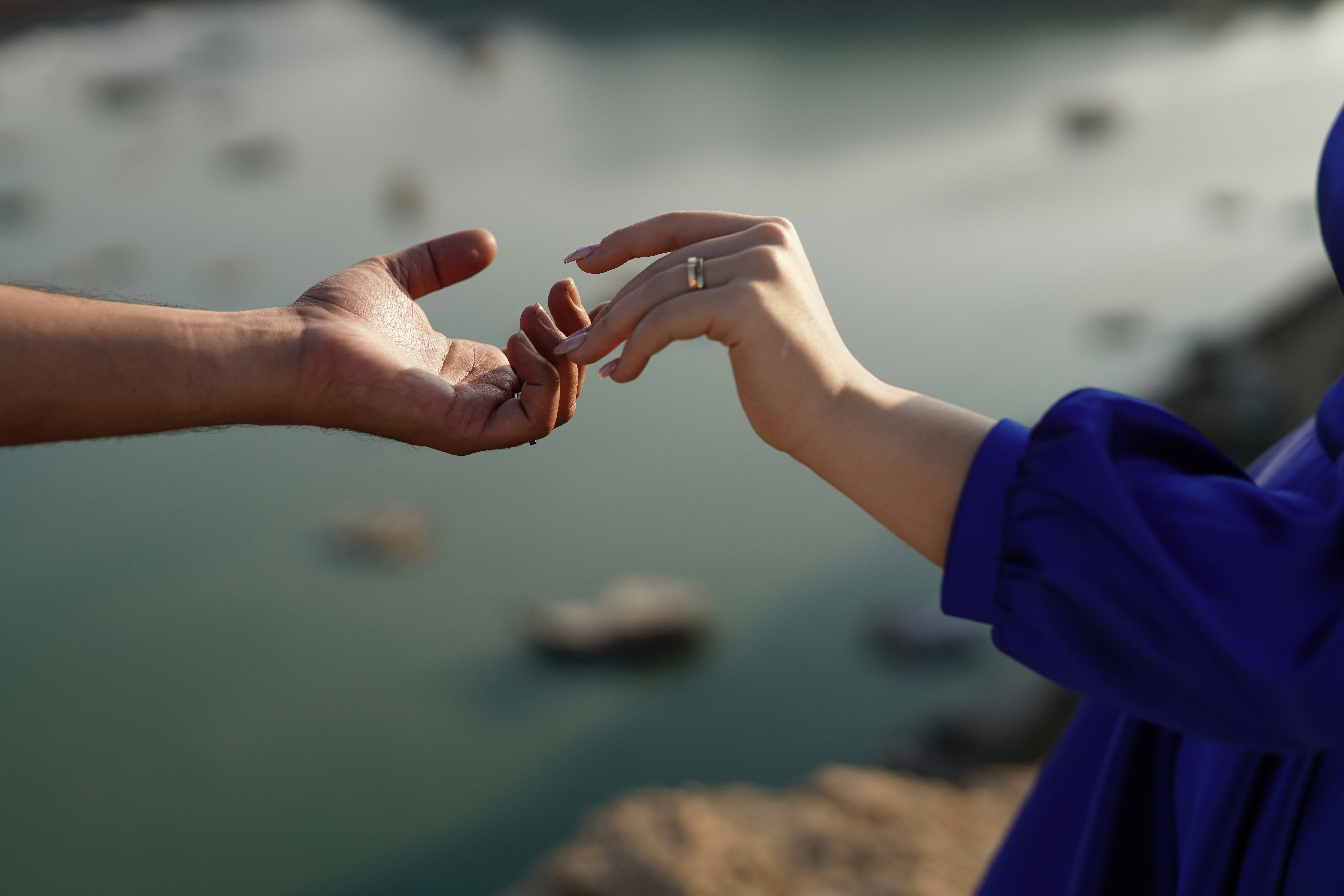 Two people reaching out their hands to each other photo – Free Symbol ...