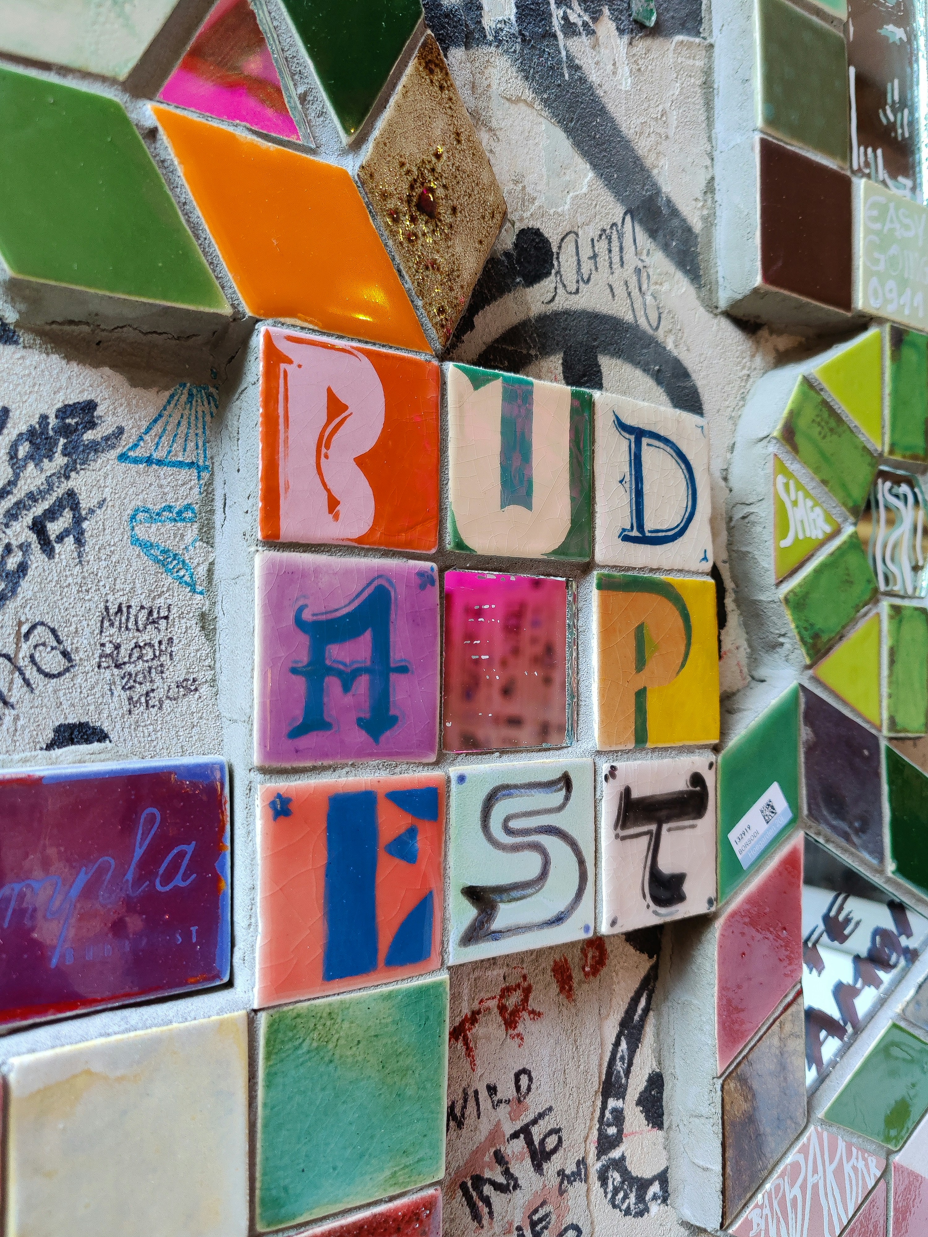 Tile Mosaic Wordplay: Colorful Cubes Form a Graffiti Lesson in Letters