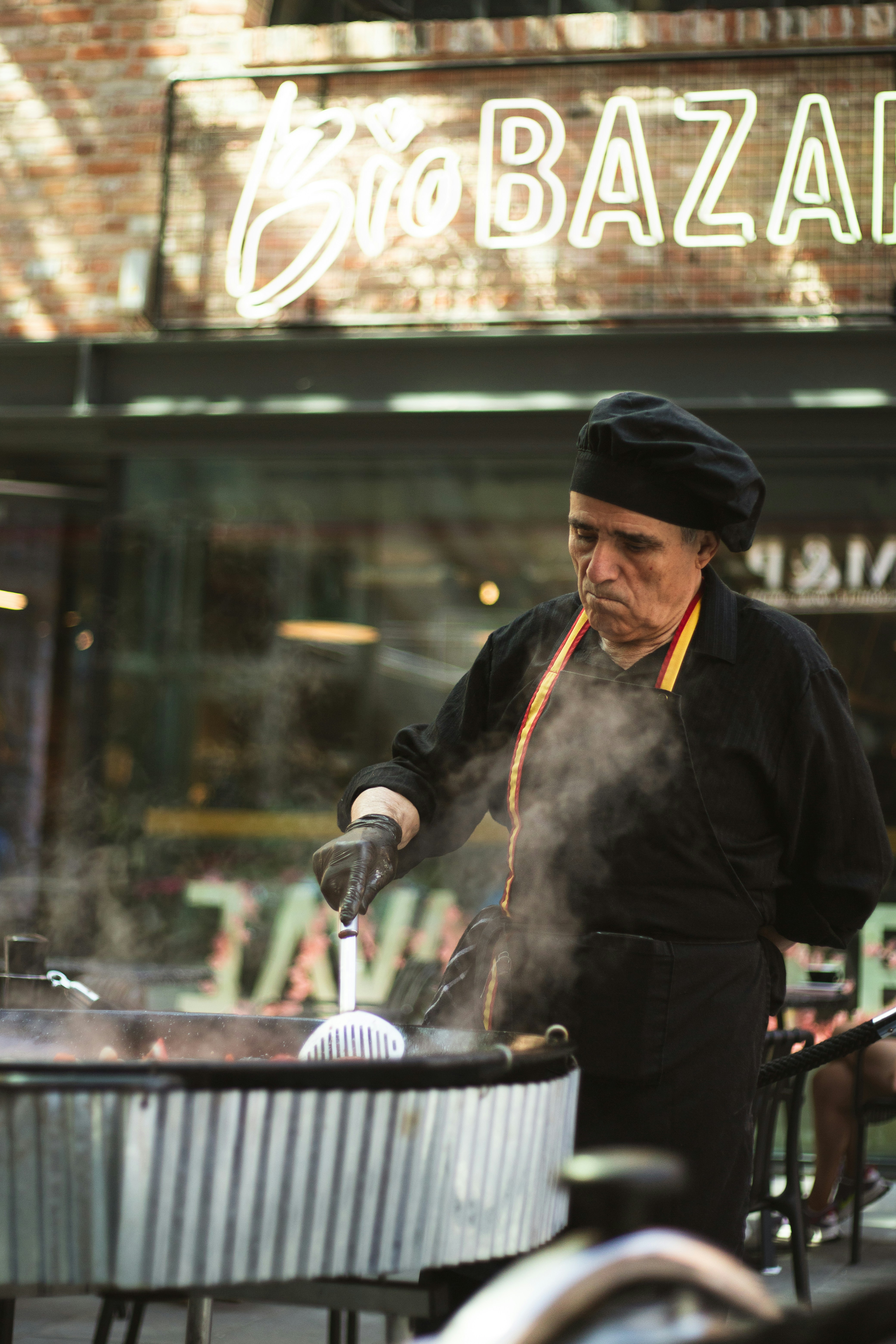 Grillmaster Under Neon Bazaar Lights