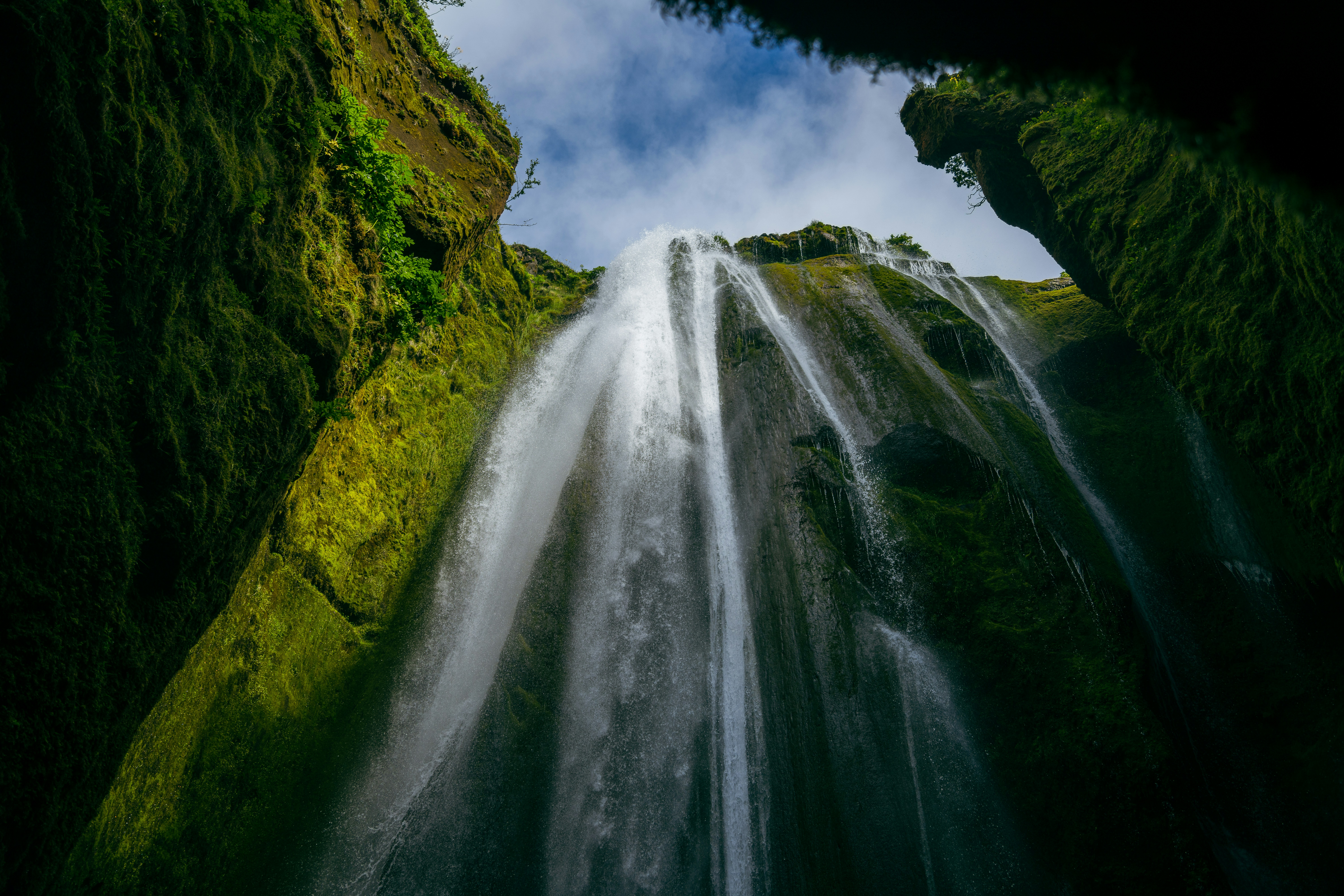 A secret waterfall hiding in a cave in Iceland.Himmel S