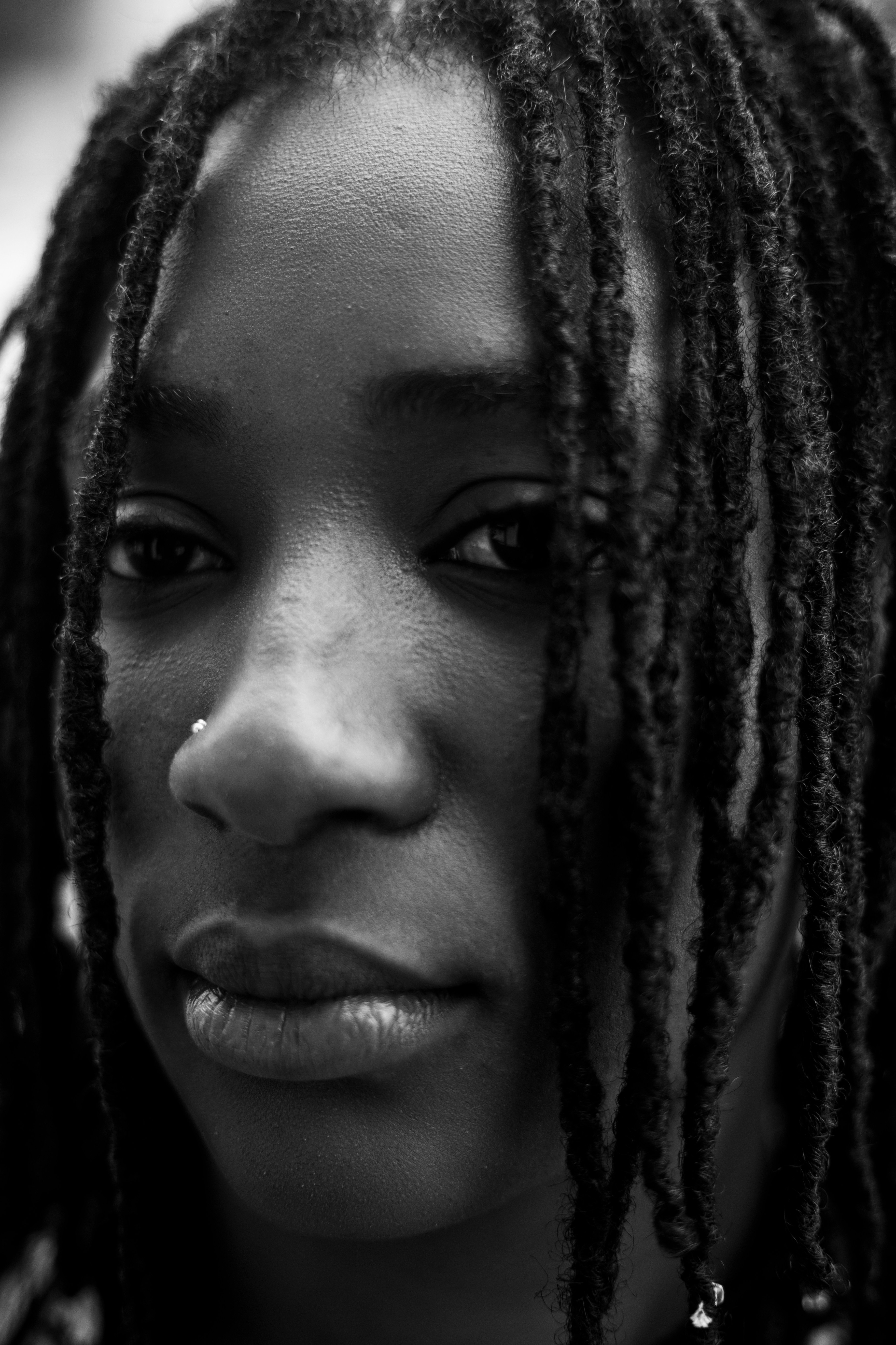 A close up of a person with dreadlocks photo – Free Head Image on Unsplash