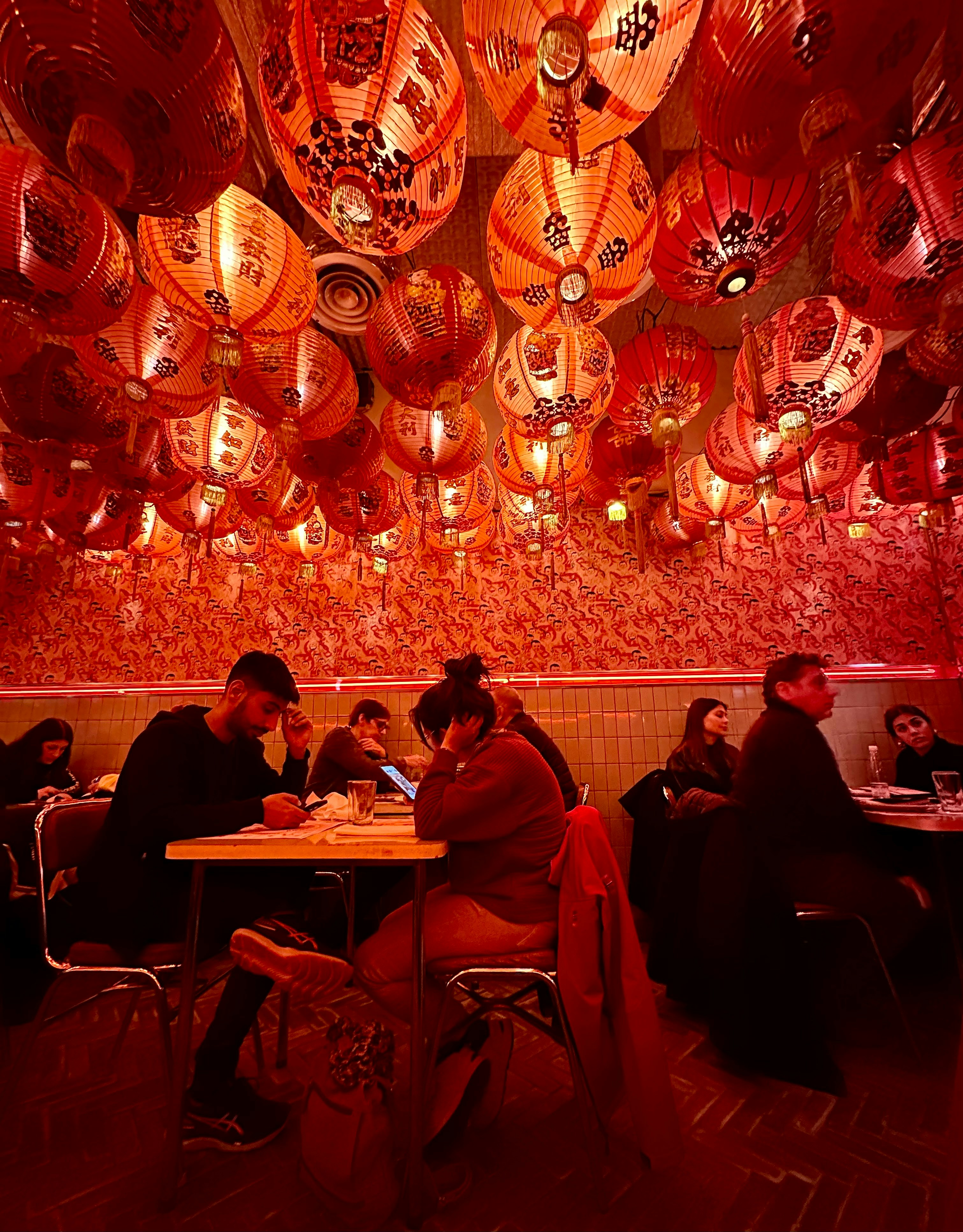 Crimson Lantern Ceiling: Quiet Bistro Moments Under Red Glow