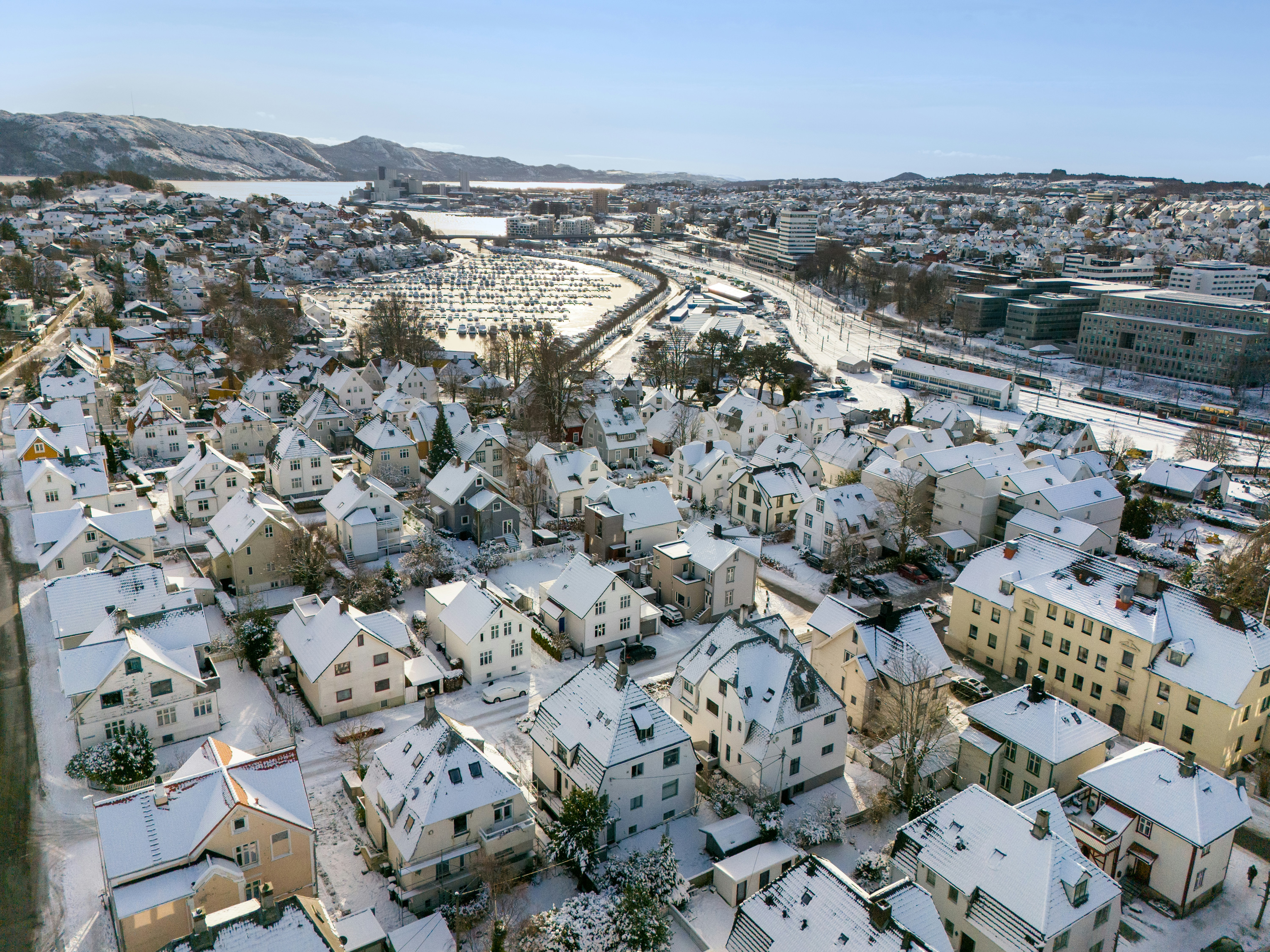 An aerial view of a snow covered city photo – Free Building Image on ...