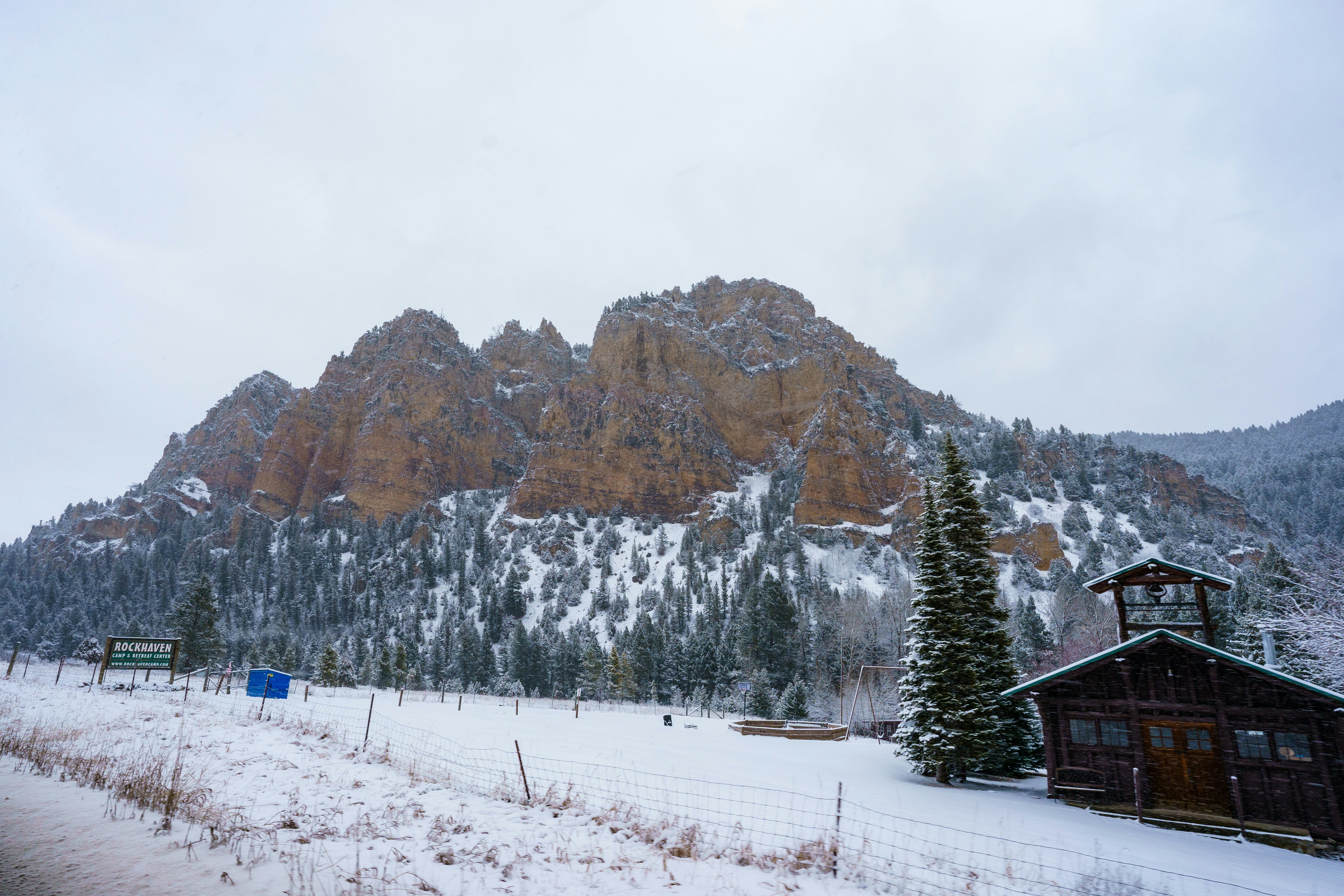 Granite Sentinels Under a Snow-Blanketed Sky