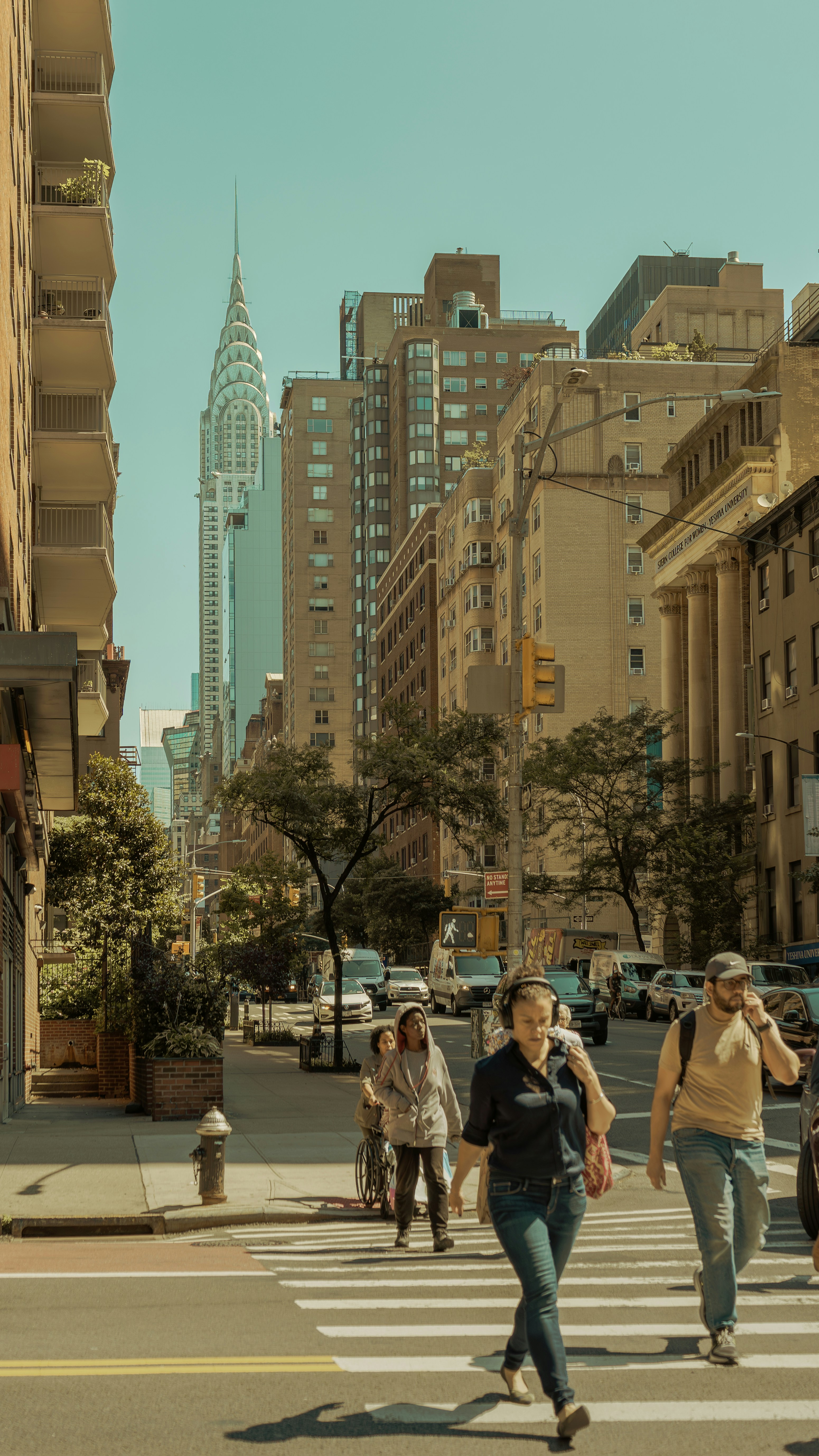 Midtown Crosswalk: Pedestrian Portraits with the Chrysler Building Rising in the Distance