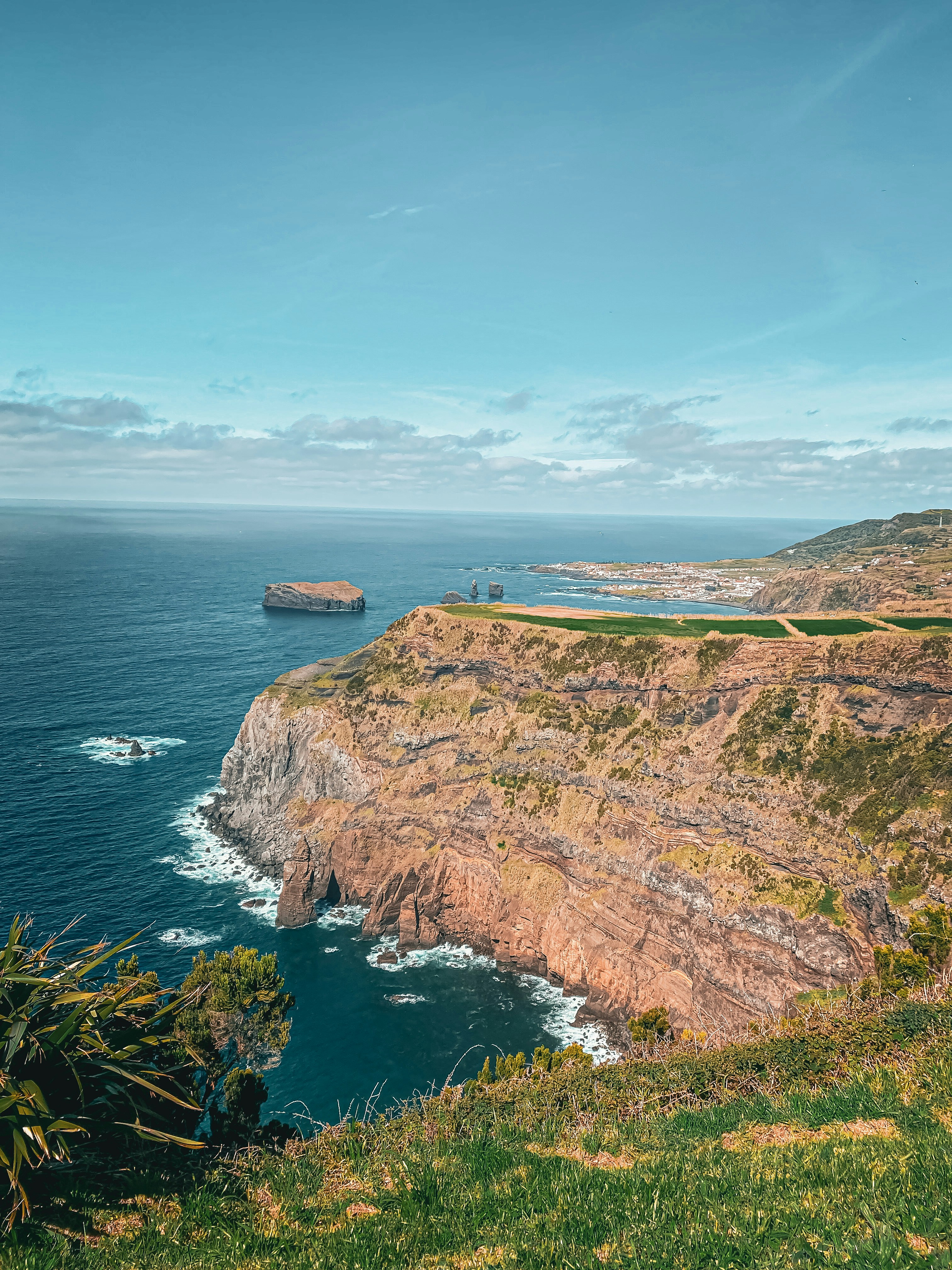 Rust-Red Cliffs Meet the Turquoise Atlantic