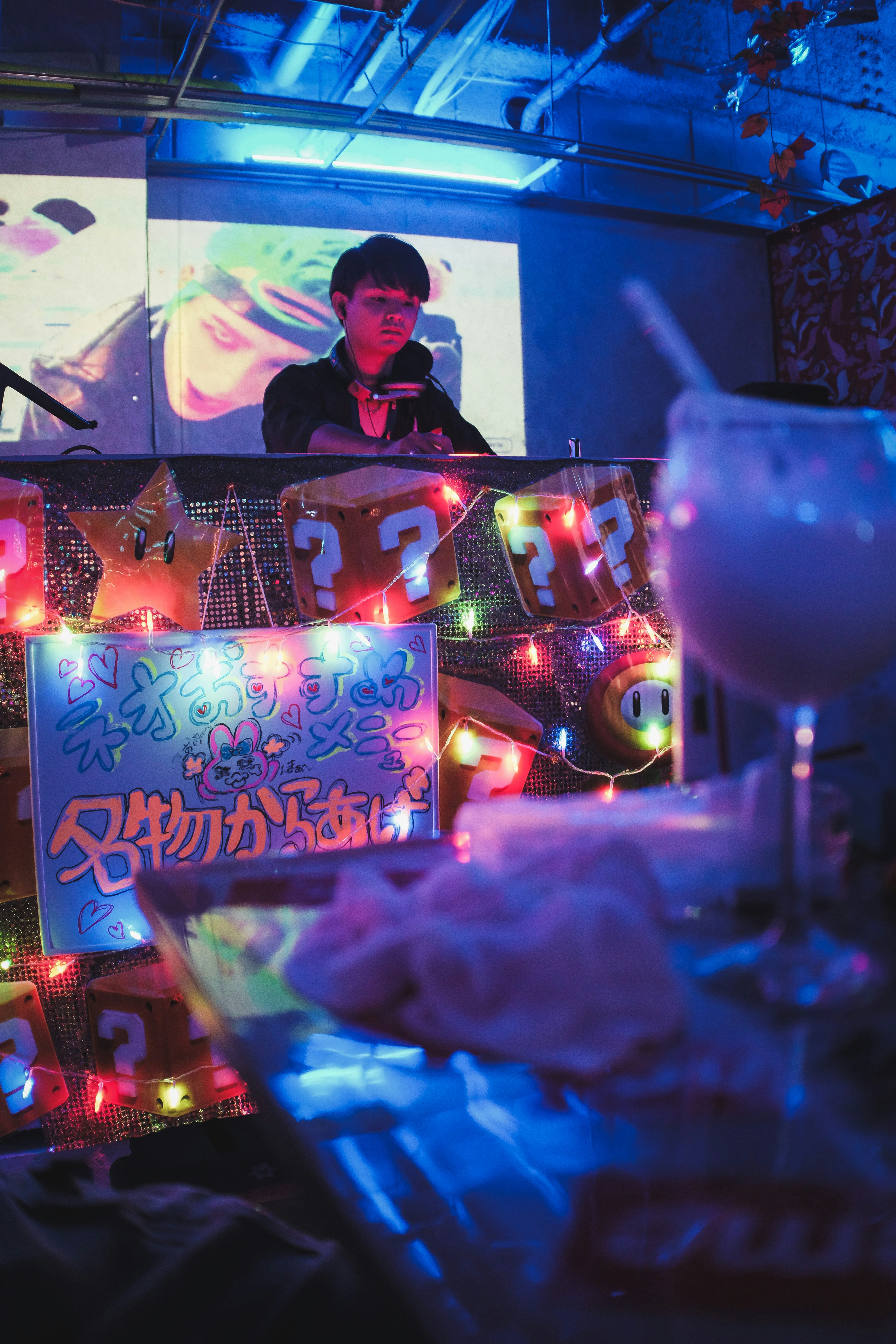 Neon Projection DJ: A Night Under Multicolored Lights