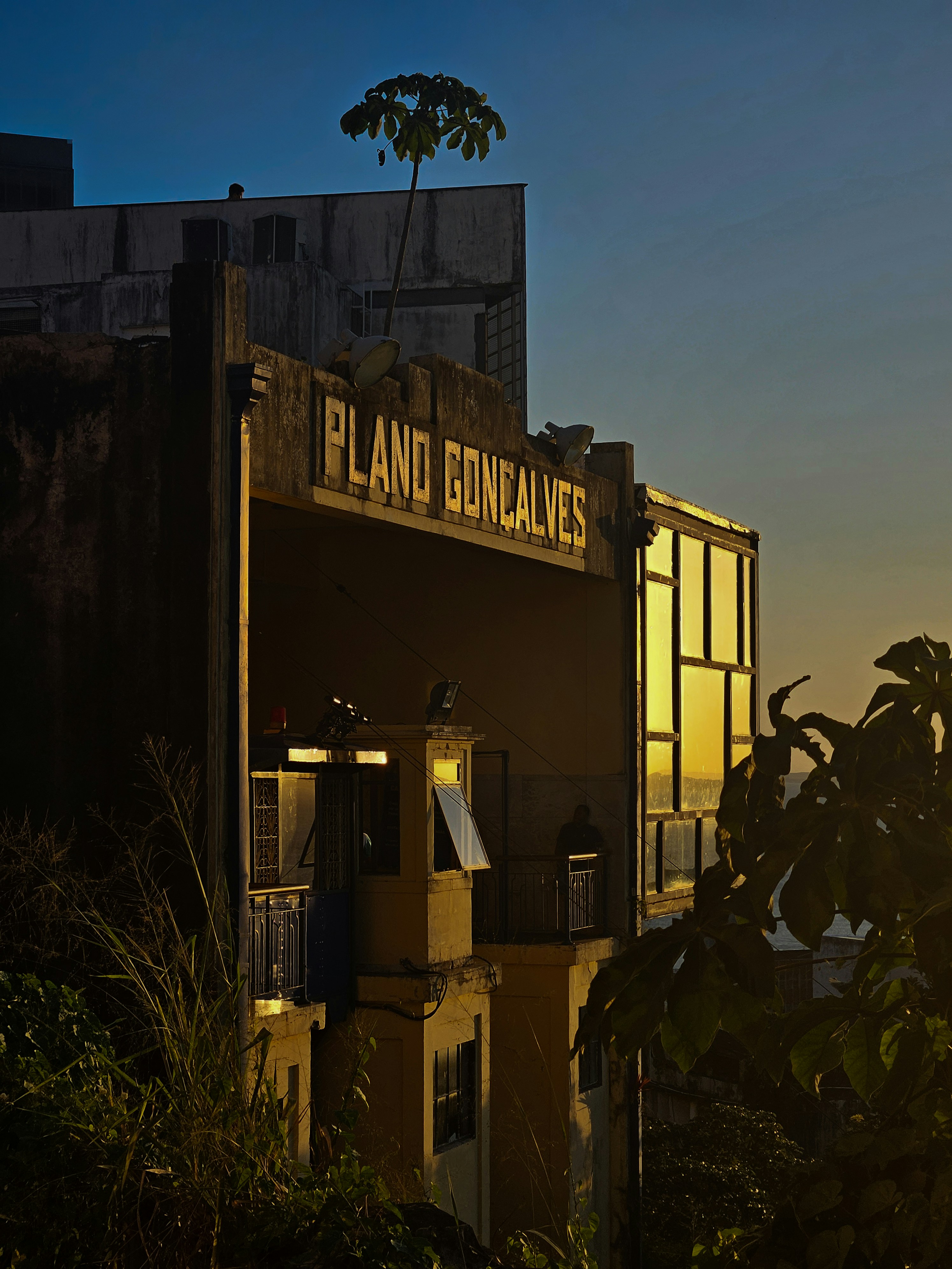 Golden Hour at Island Conclaves: Rooftop Signage and Sunset Glass