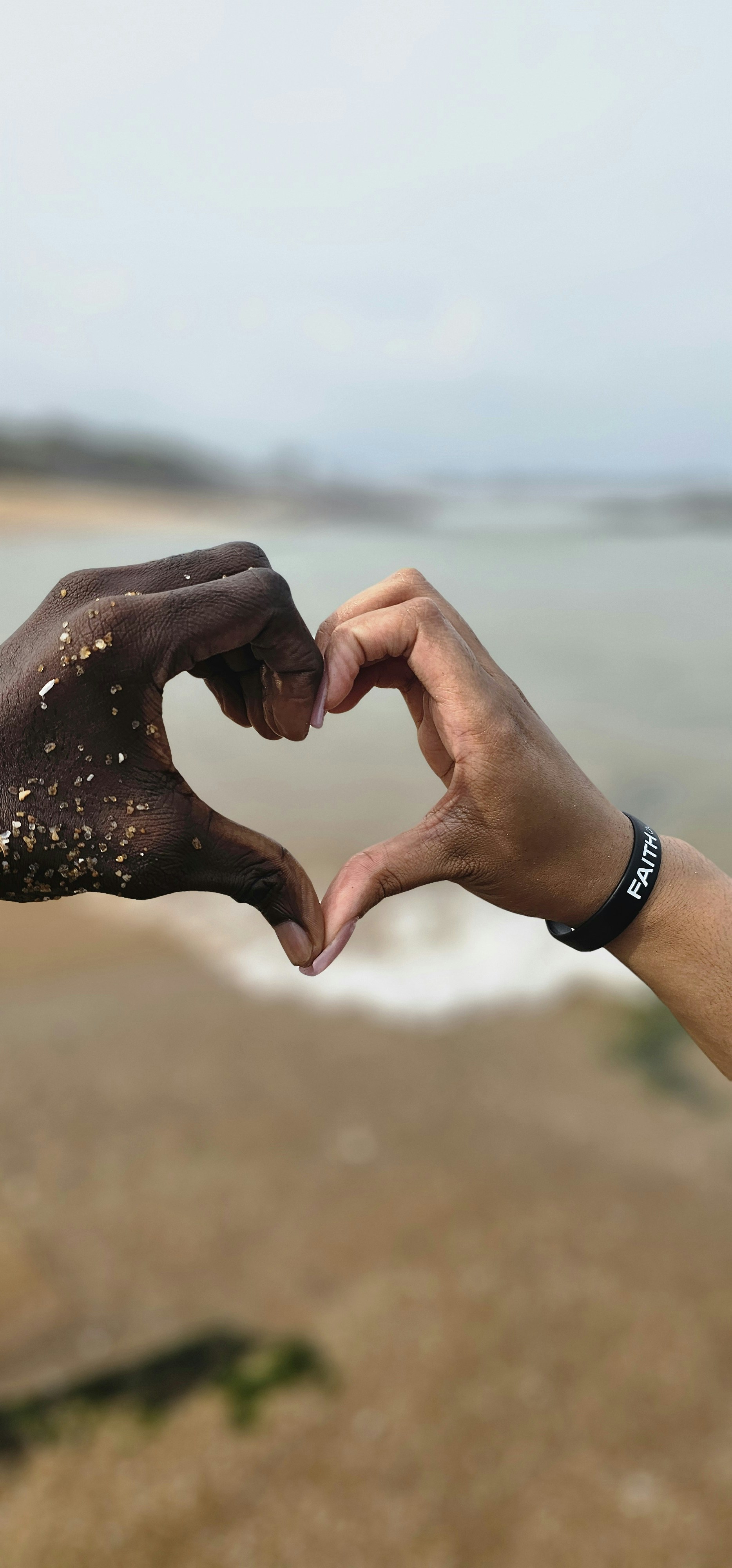 Two hands making a heart shape with their fingers photo – Free Beach ...