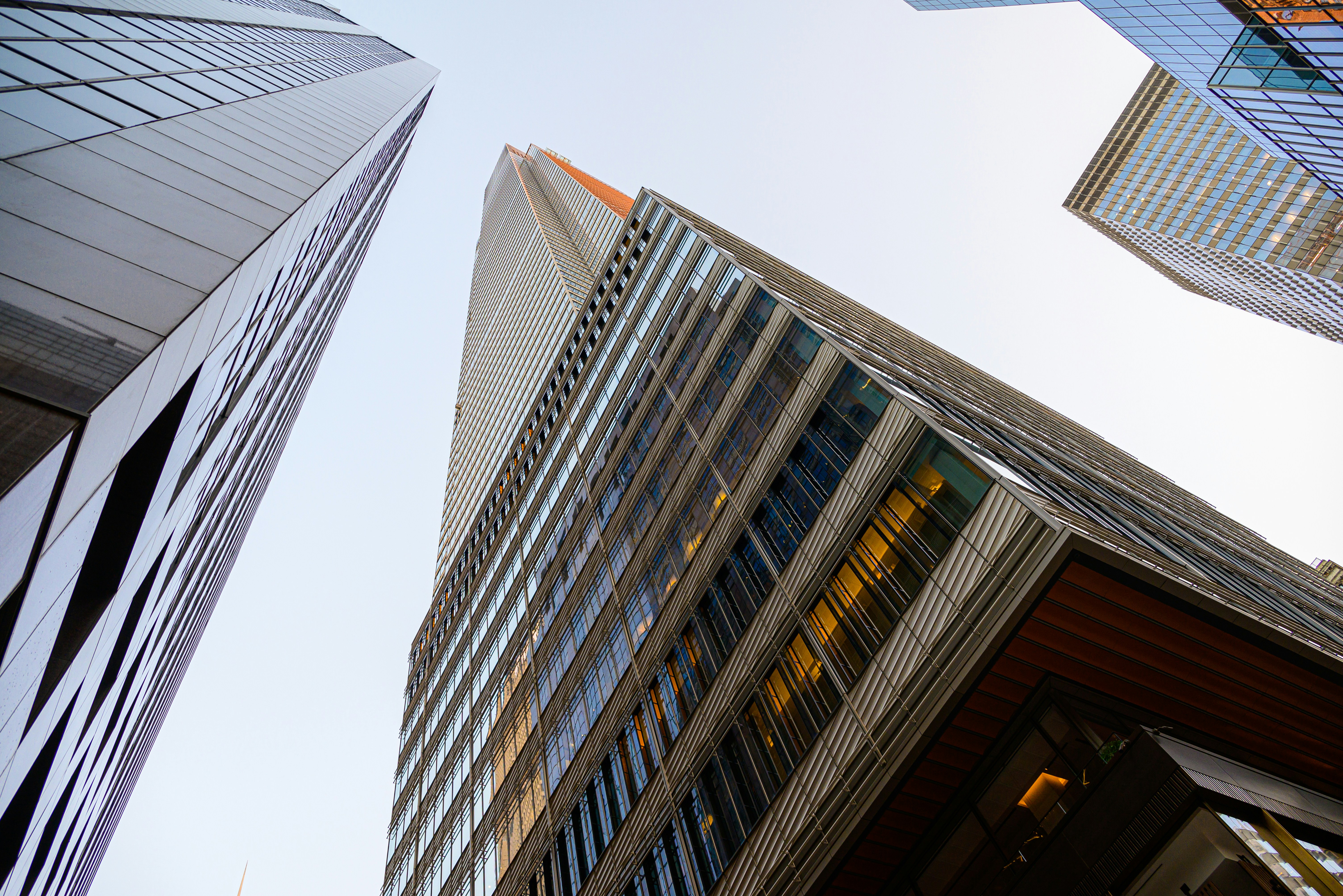 Looking up at tall buildings in a city photo – Free City Image on Unsplash