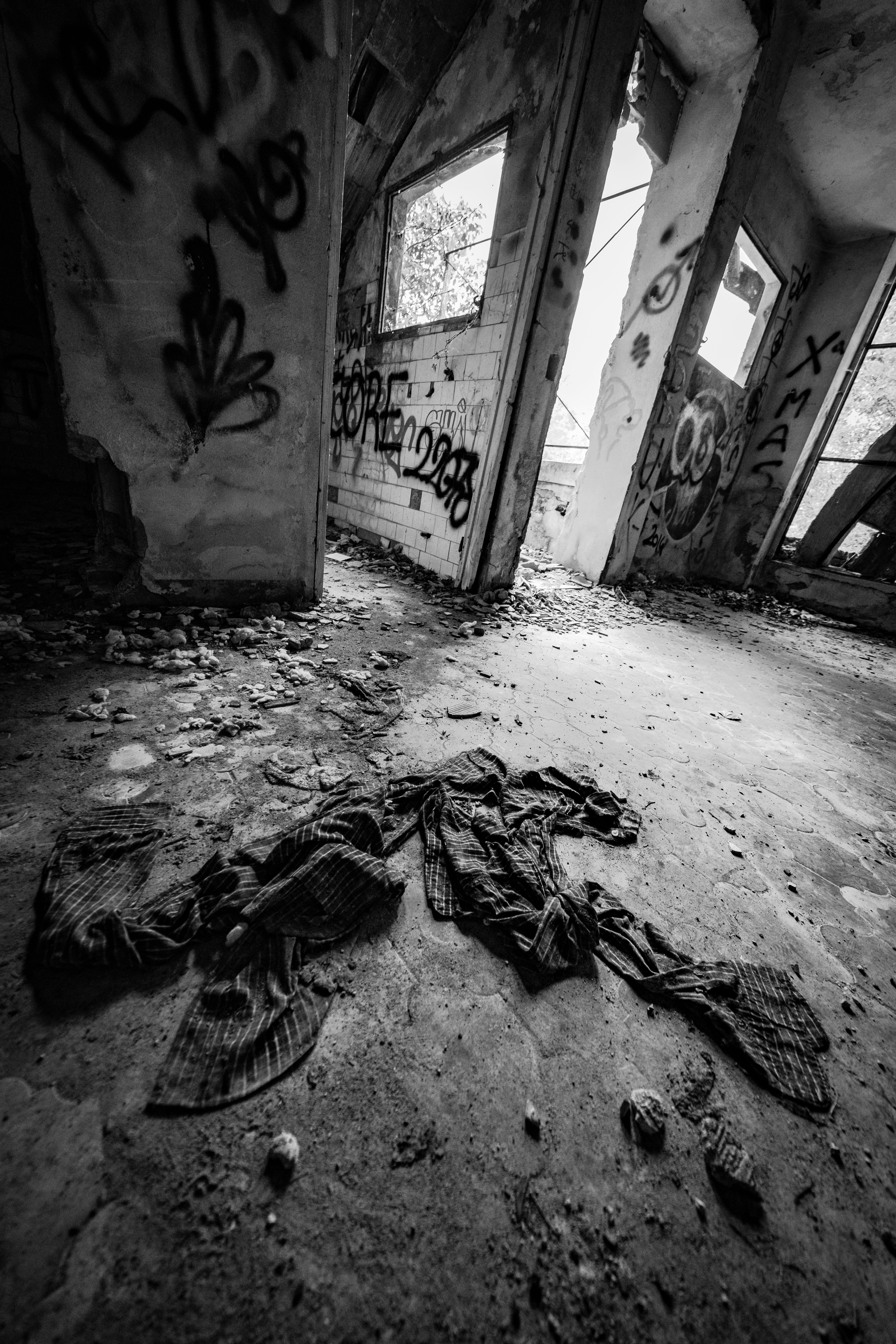 Ragged Relics in a Graffiti-Scarred Ruin