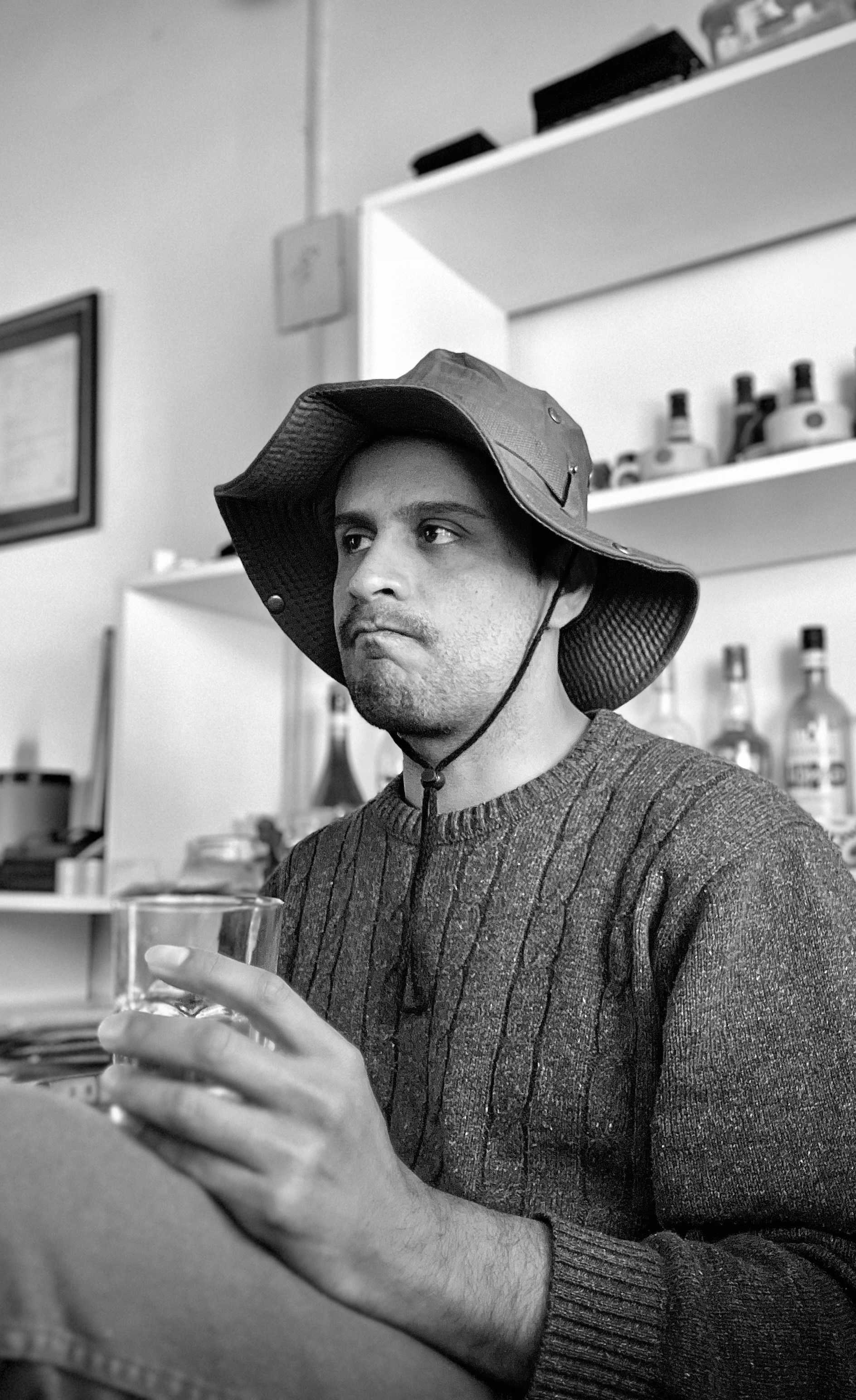 Quiet Confidence: A Casual Portrait in a Bar Setting