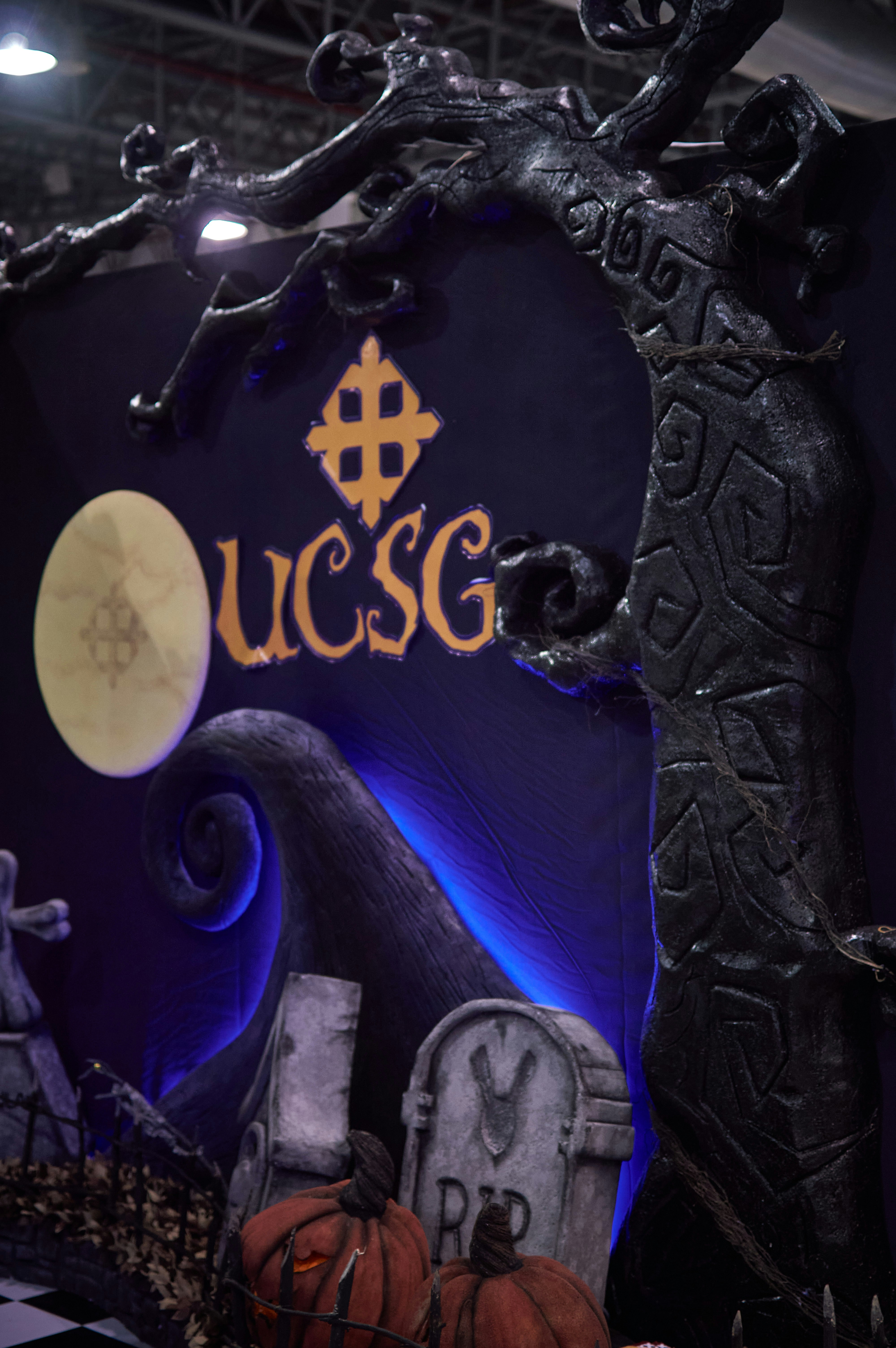 Glyphs Under Purple: A USG Booth's Halloween Tableau
